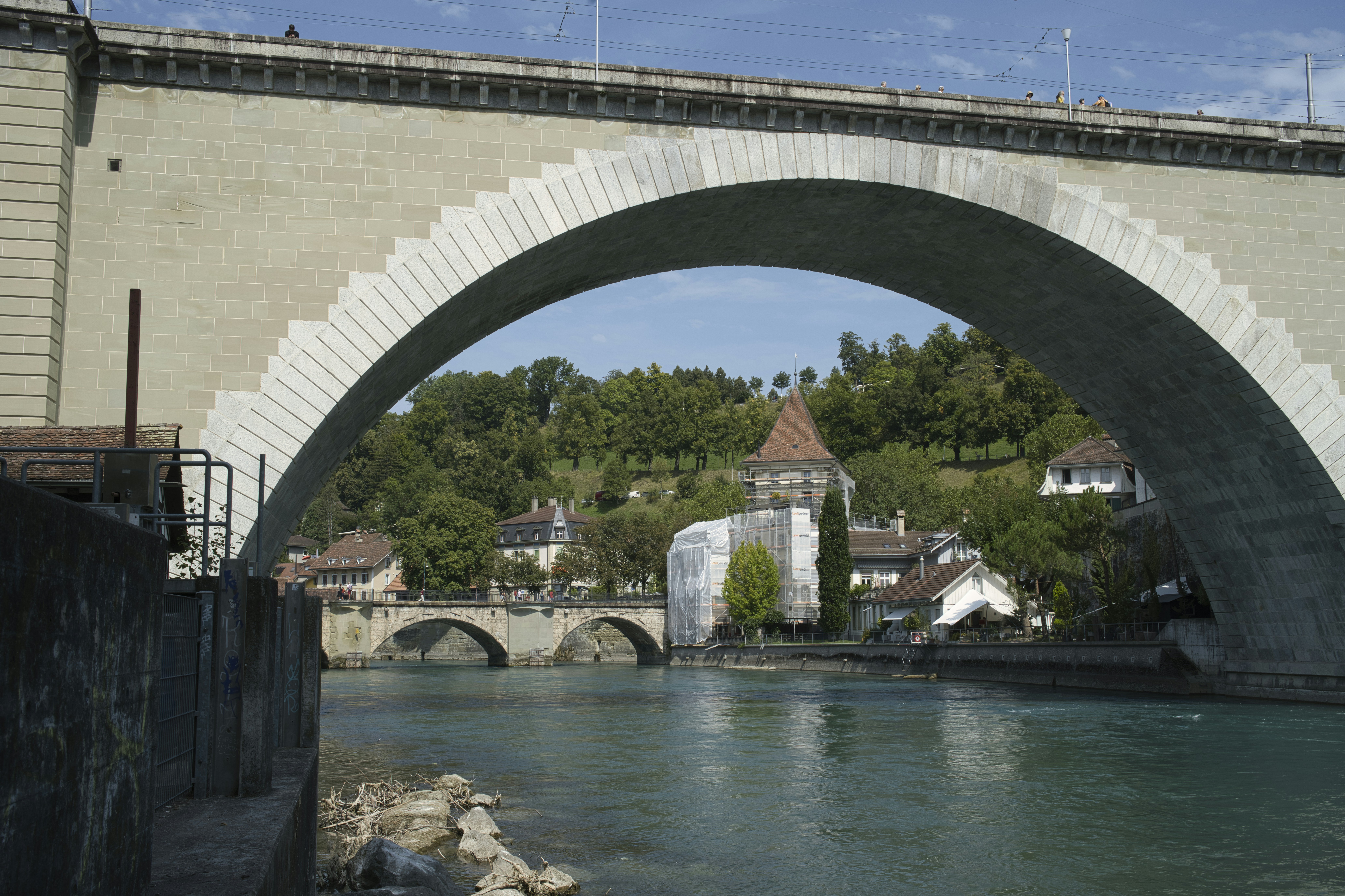 Arcade of the Rhine: Gravel Stone Arch Framing a Tranquil Town