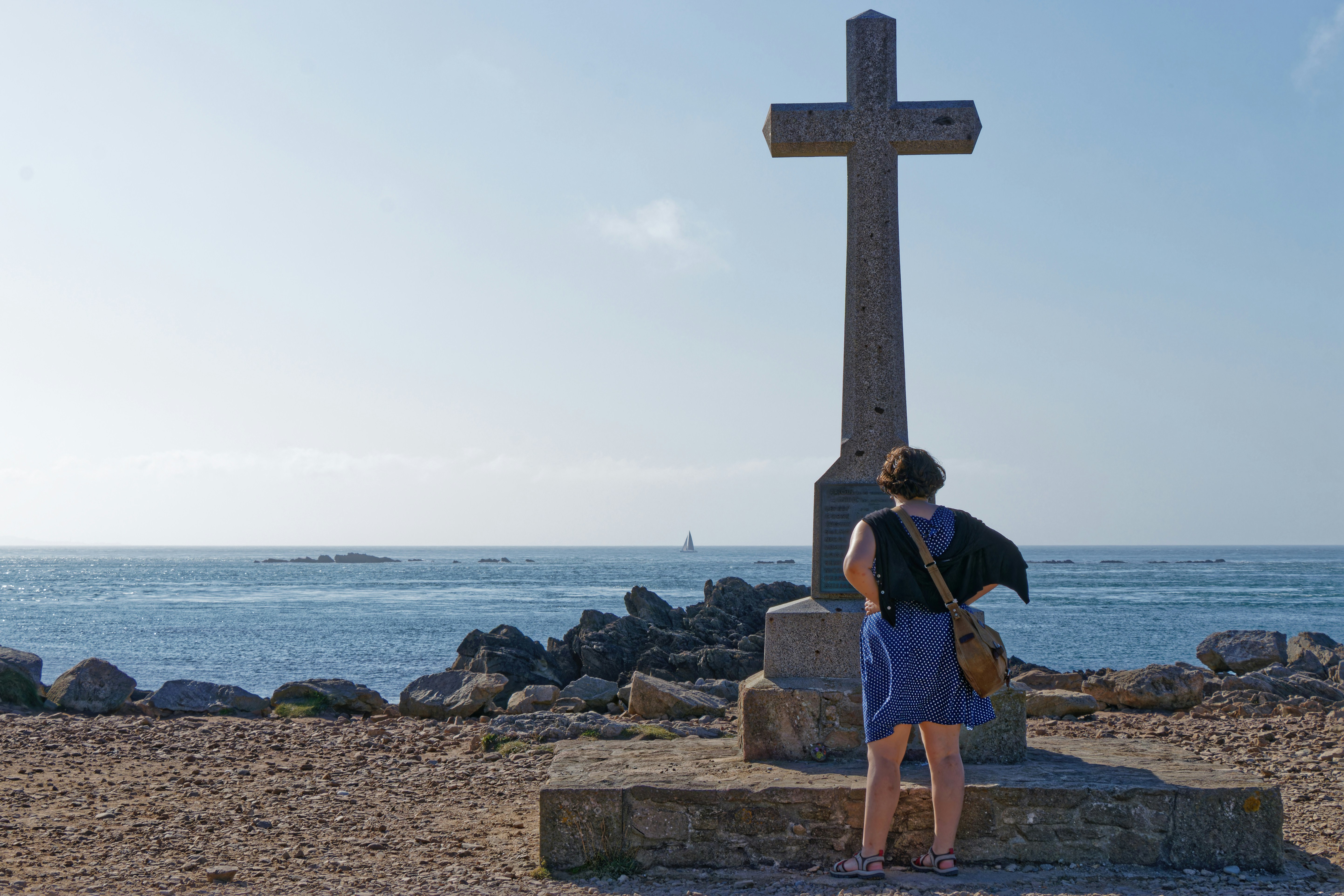 Seaside Cross: Footsteps at a Weathered Monument