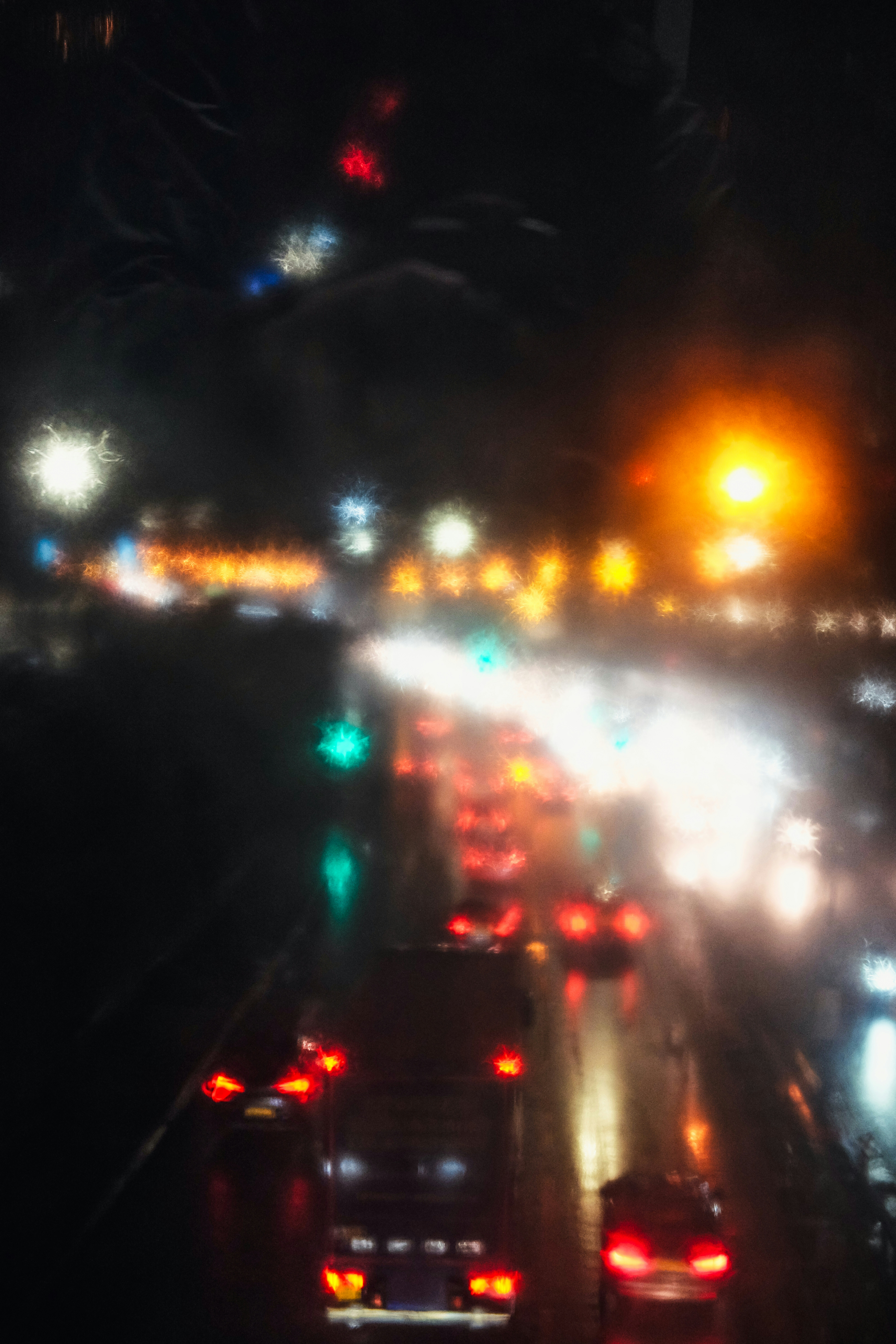 A long line of traffic on a highway at night photo – Free Poplar Image ...