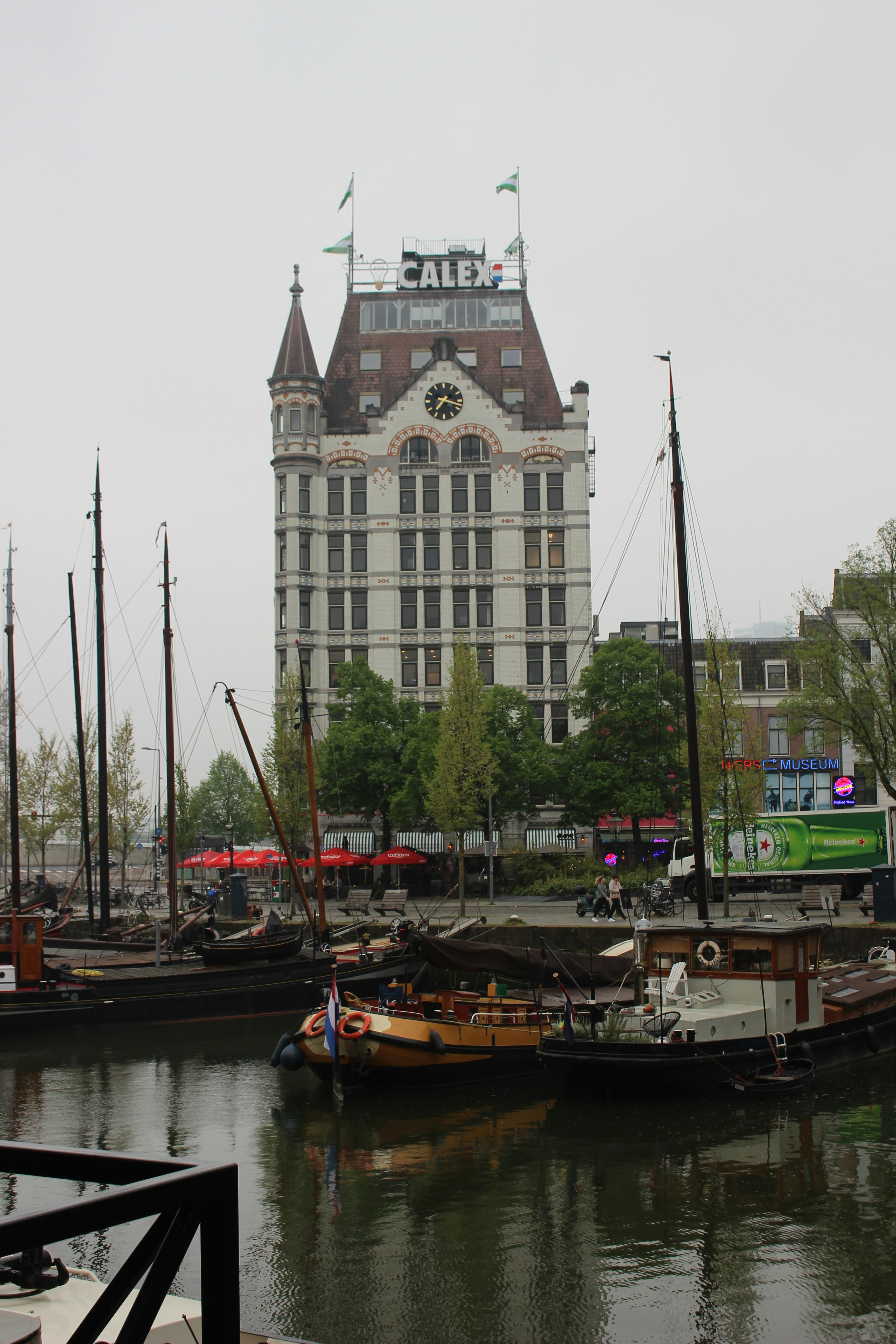 Clocktower Rising Over a Masted Marina