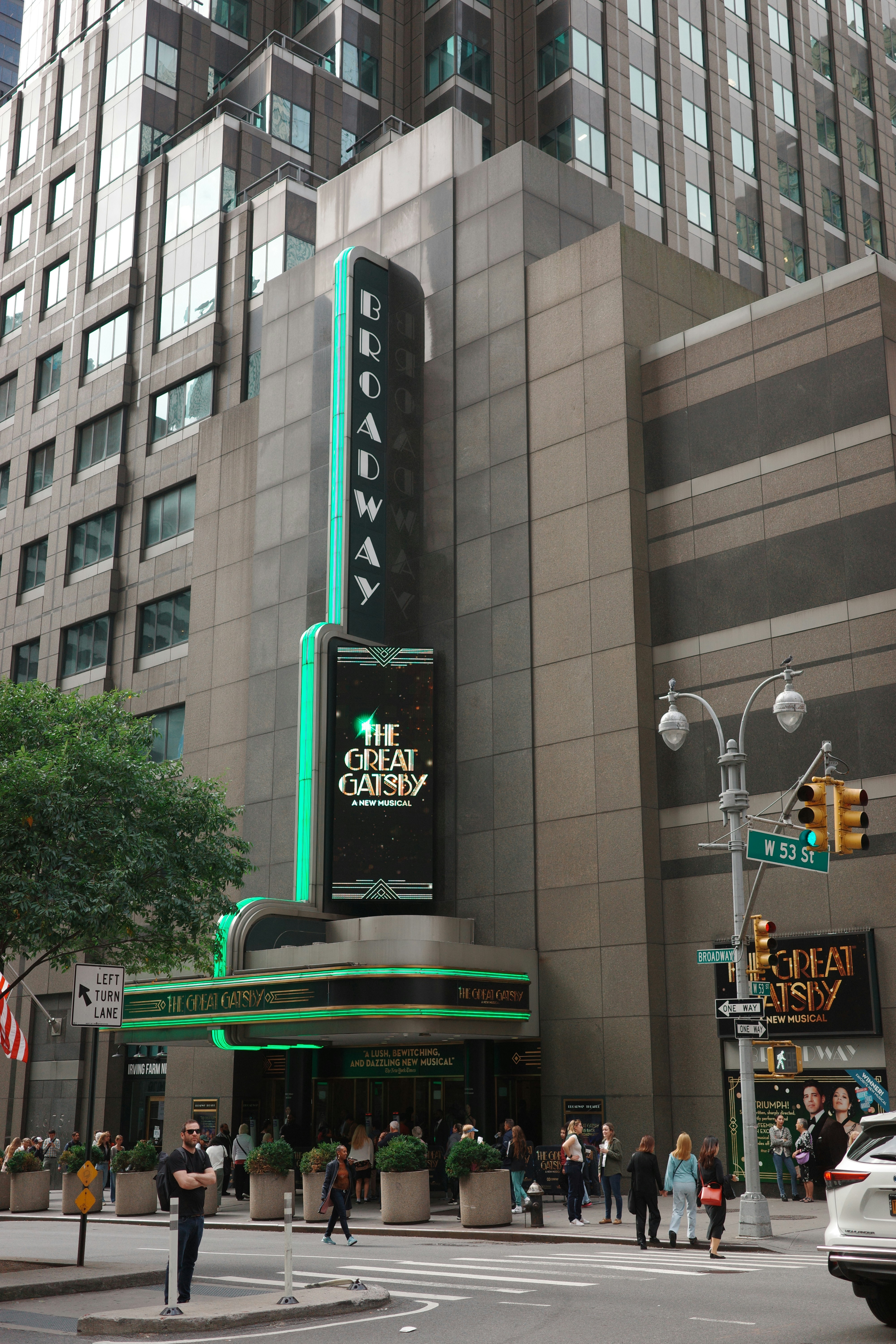 Neon Broadway: The Great Gatsby Marquee Illuminates a City Block