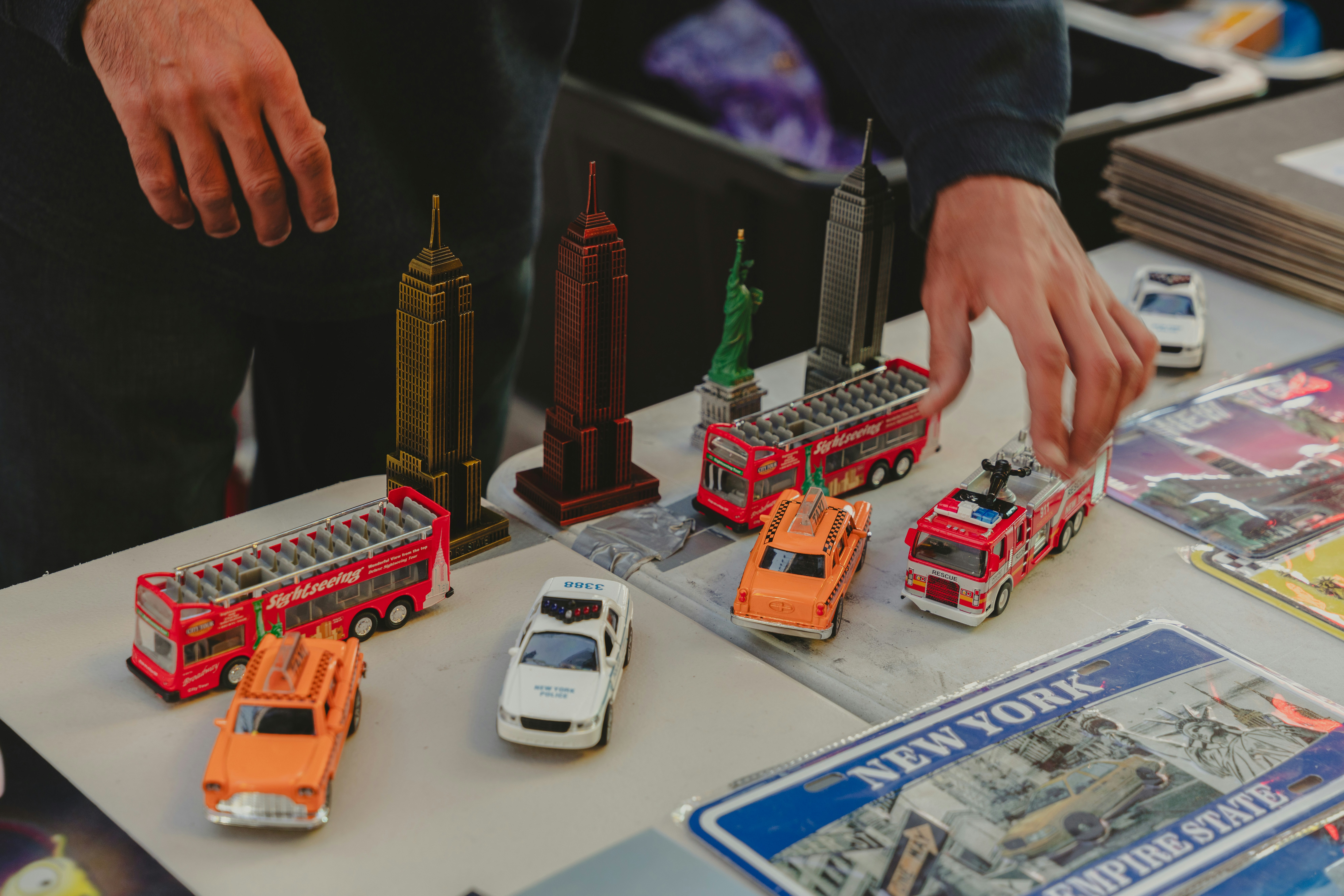 Miniature City Parade on a Desk: A Toy Traffic Tableau
