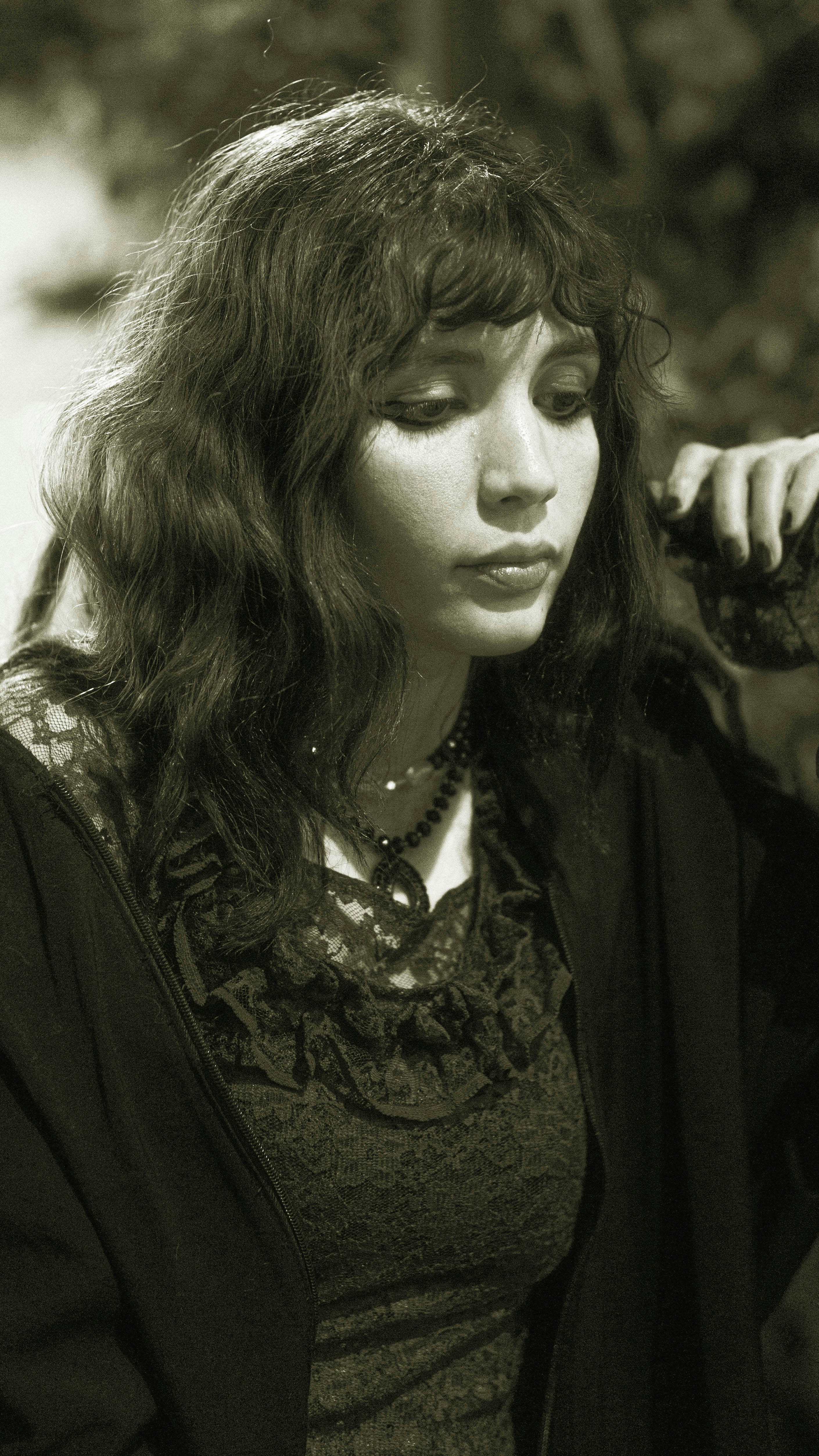 Whispers in Lace: A Quiet Monochrome Portrait