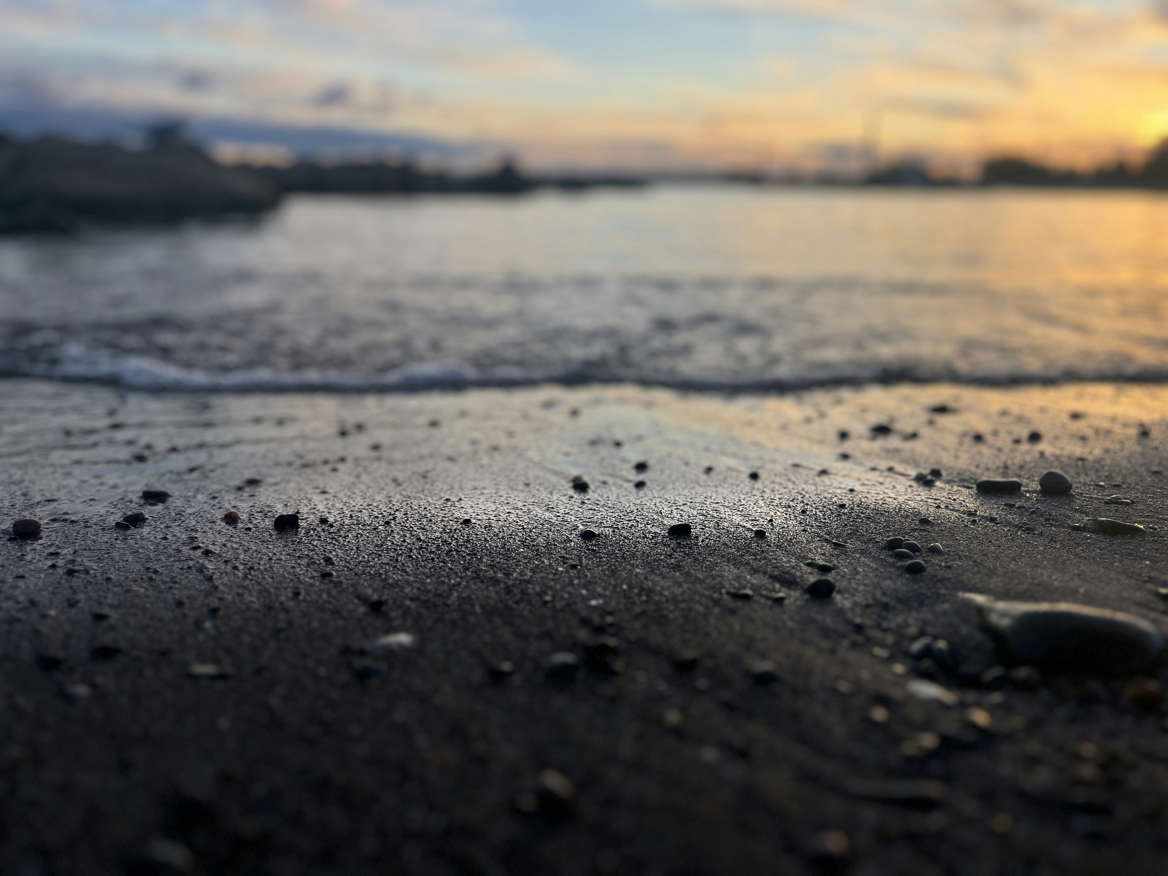 Pebbles in Focus at Dusk: Quiet Shoreline Study