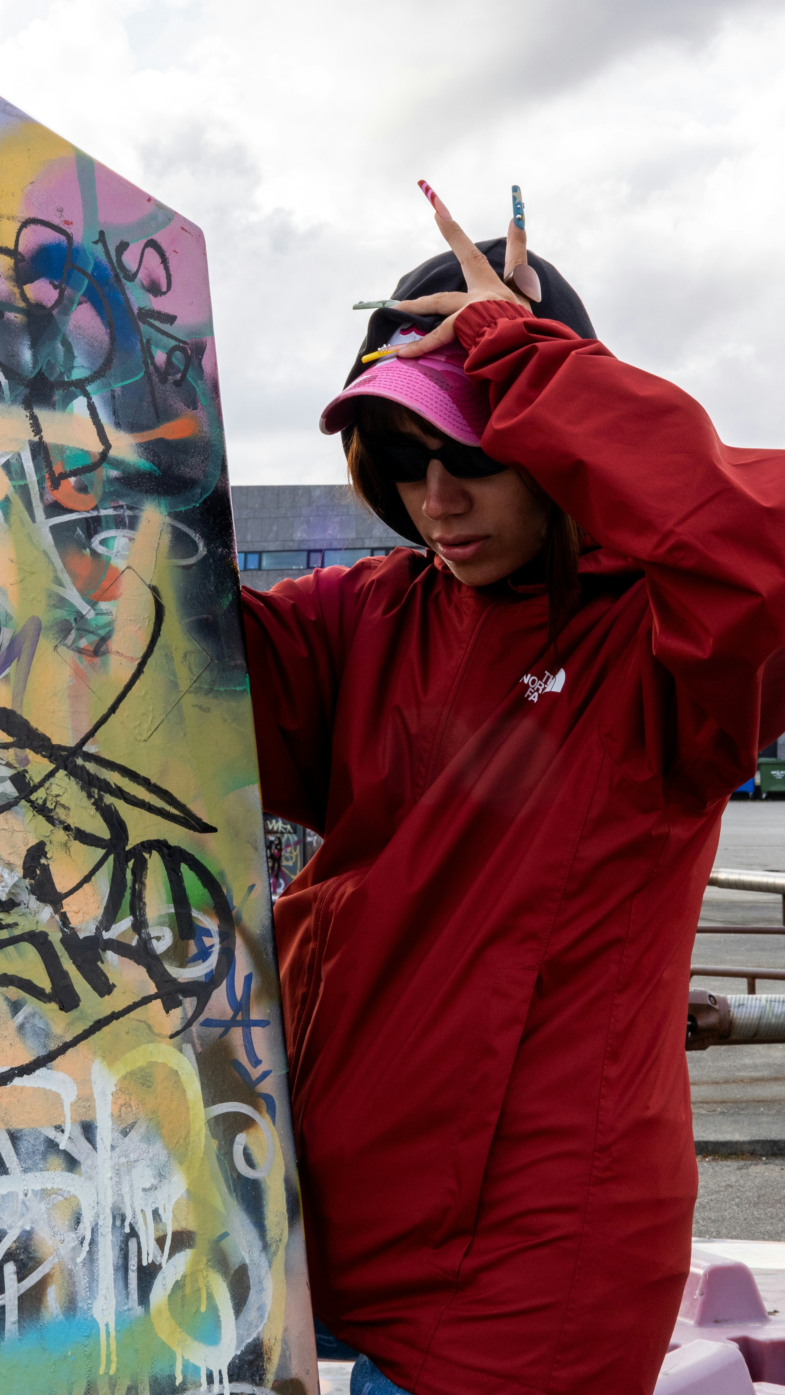 Red Windbreaker Portrait at the Graffiti Panel
