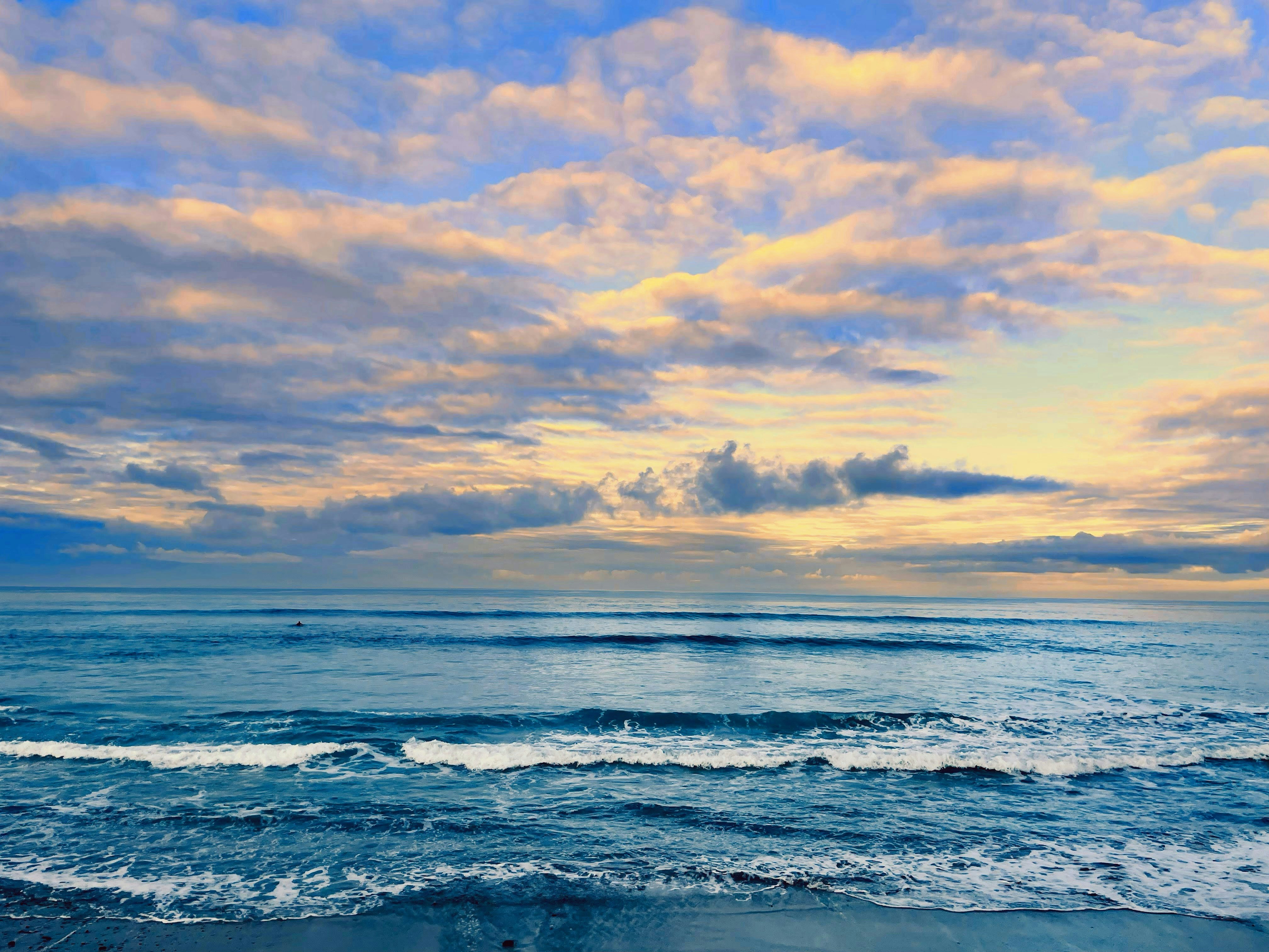 A view of the ocean from a beach photo – Free Ocean sky Image on Unsplash