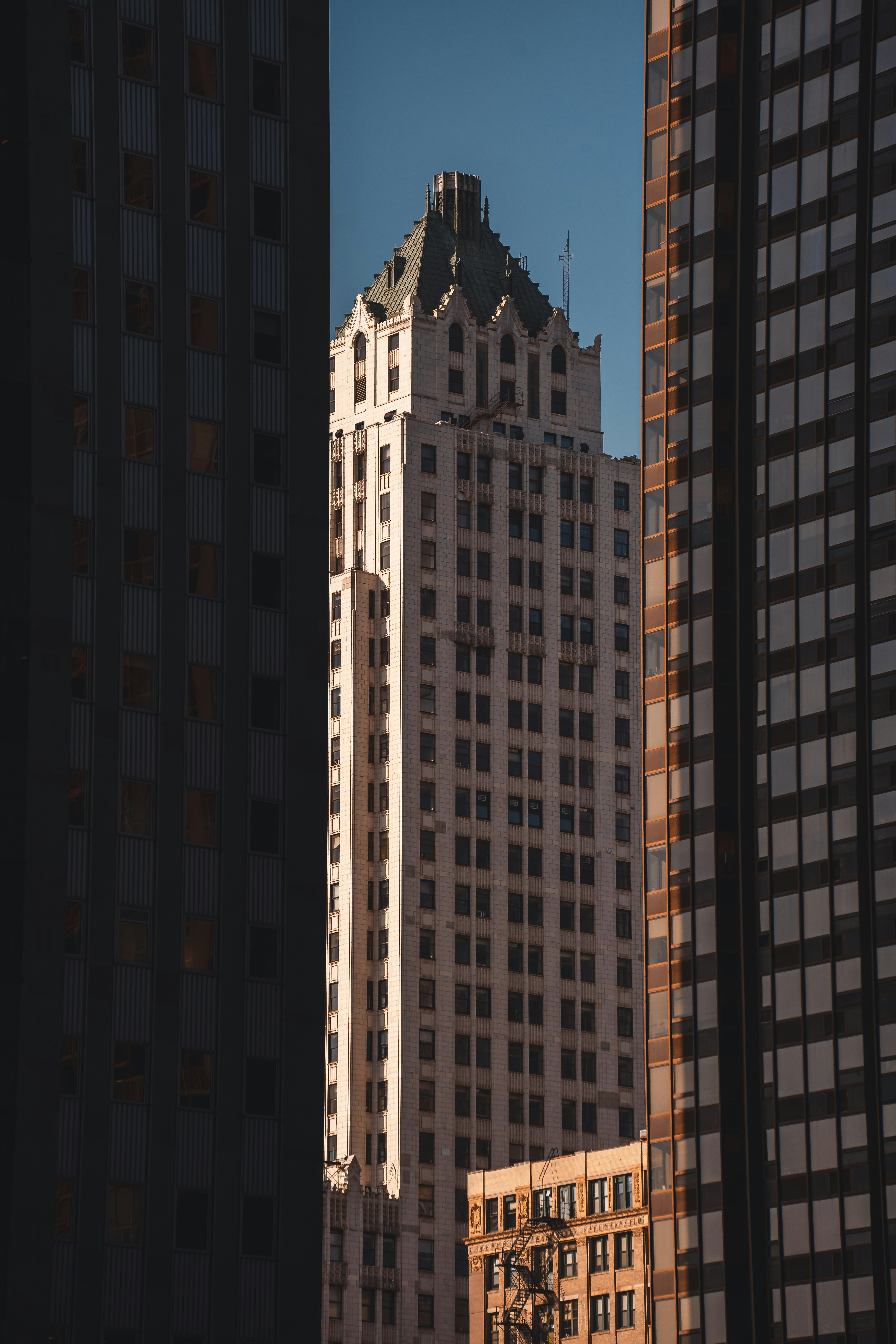 A view of tall buildings in a city photo – Free Town Image on Unsplash