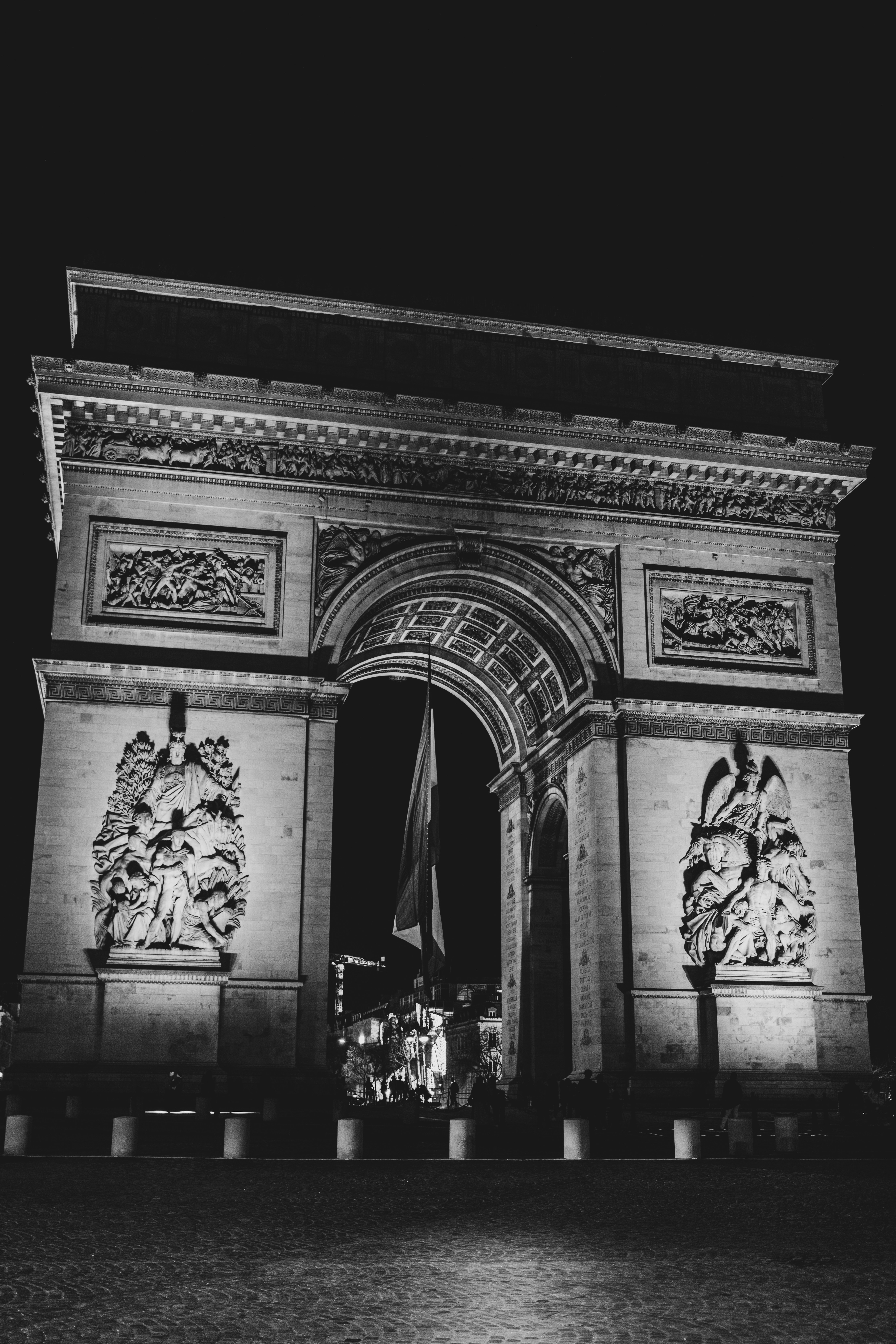 Moonlit Arch: The Arc de Triomphe Silhouetted in Noir