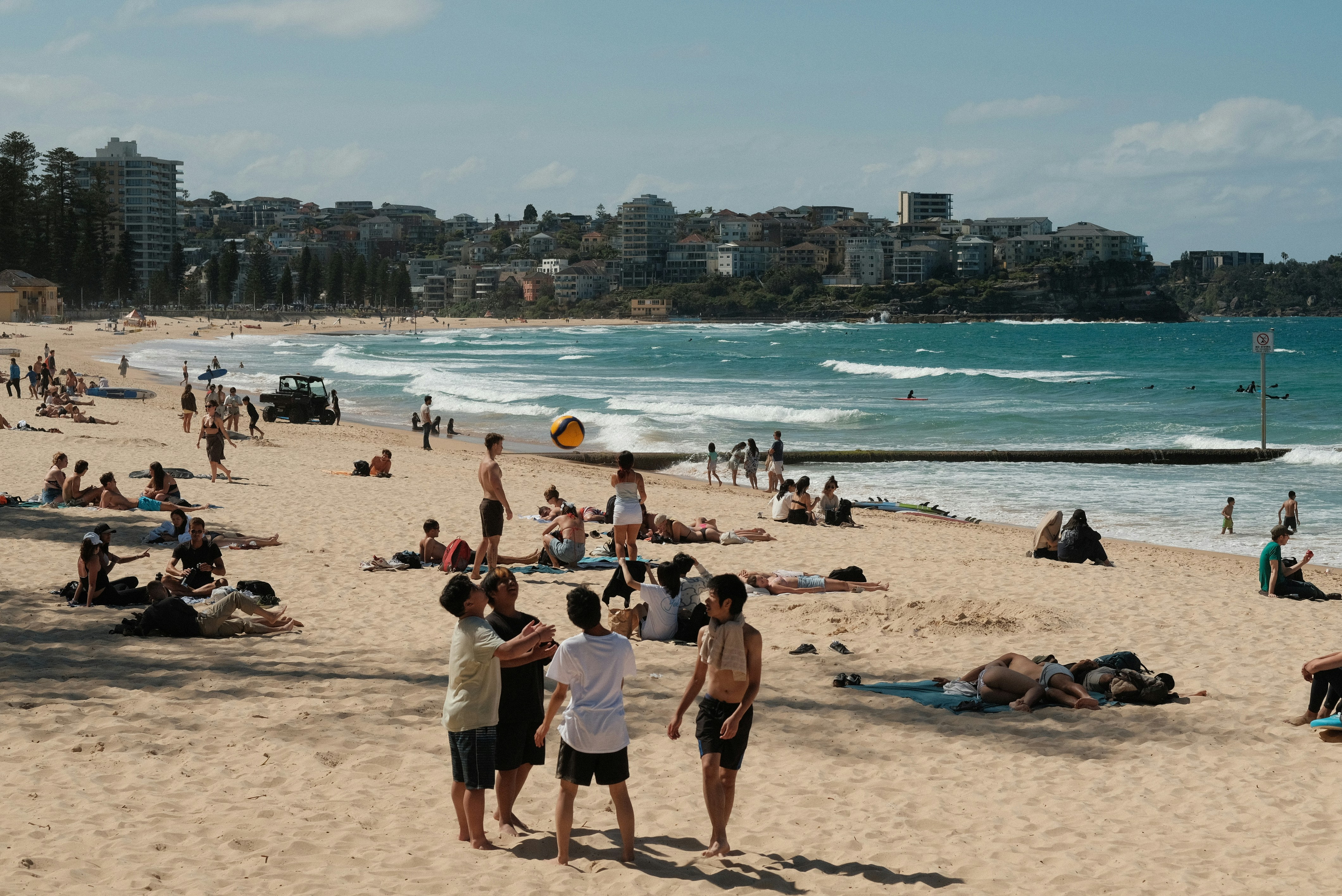 A crowded beach with many people on it photo – Free Manly beach Image ...