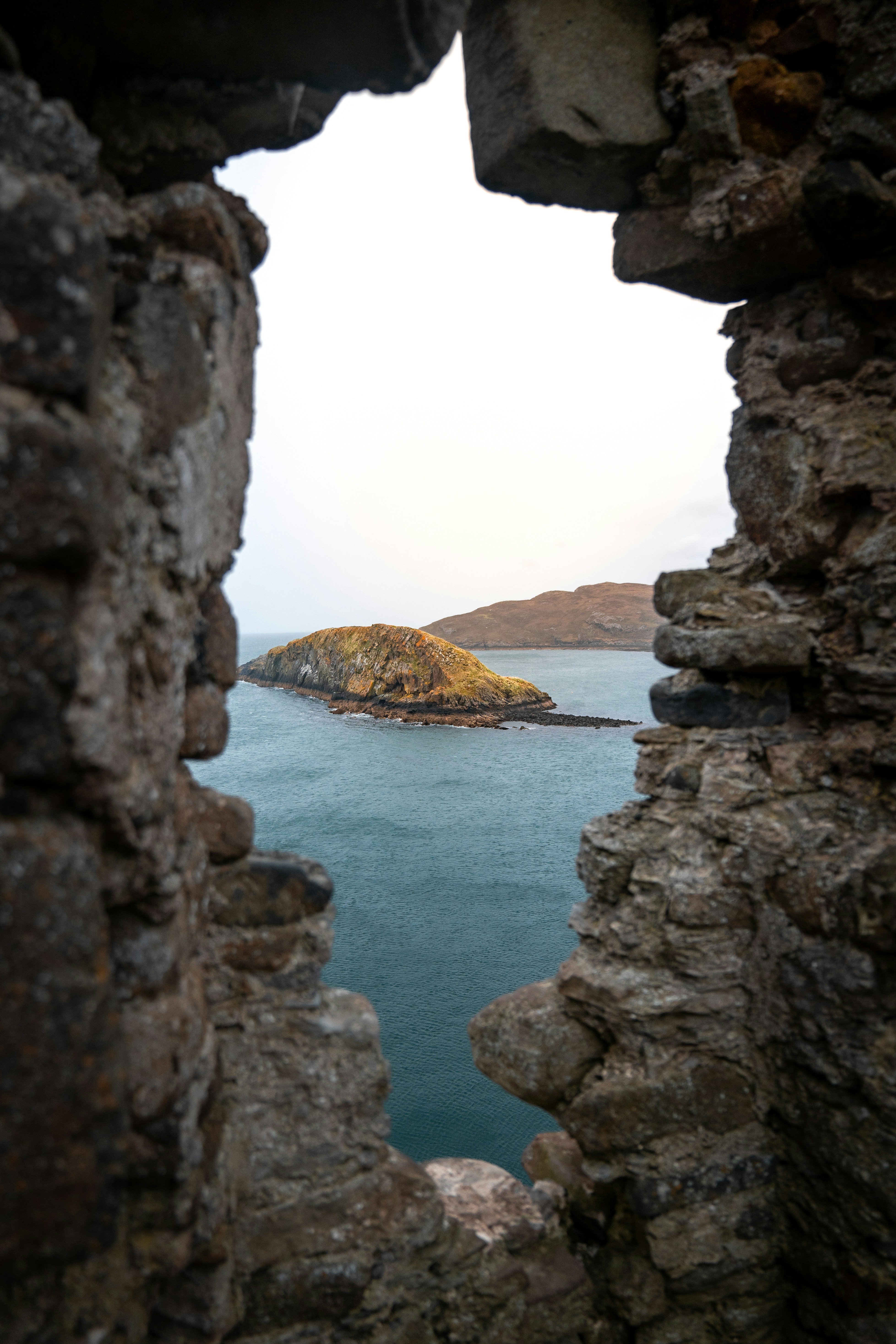 A view of a body of water through a window photo – Free Skye Image on ...