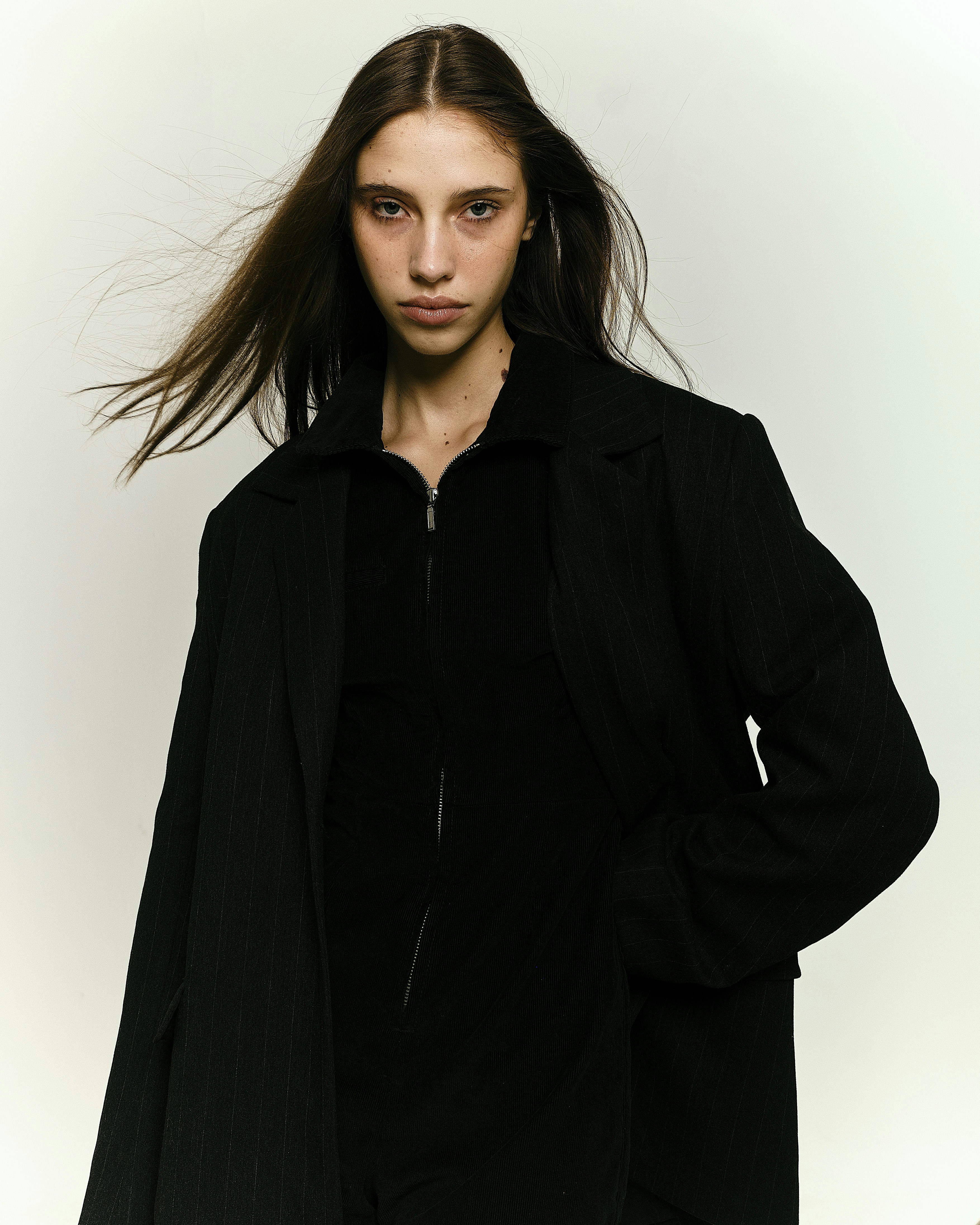 A woman with long hair walking down a runway photo – Free Photography ...