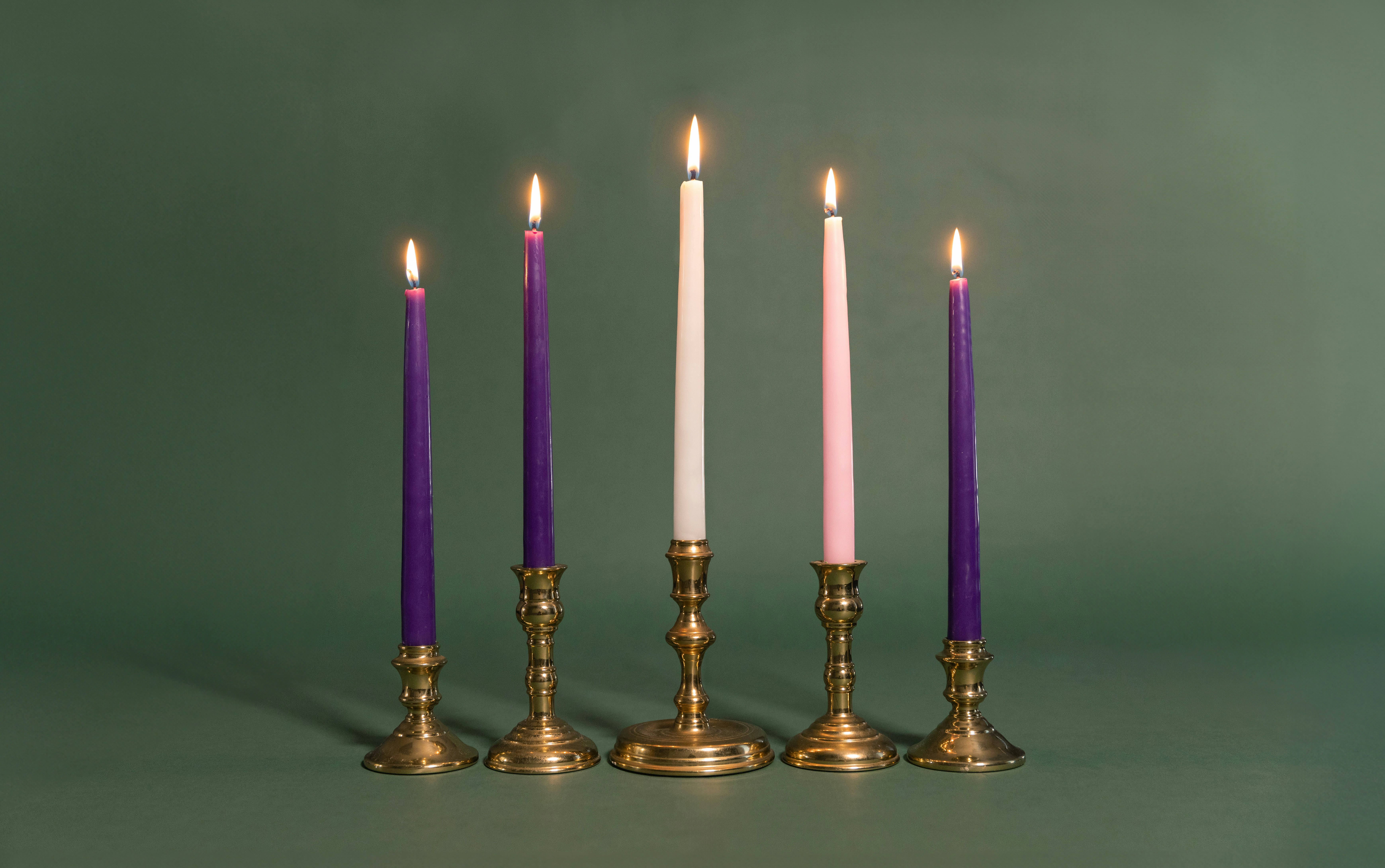 A group of candles sitting next to each other photo – Free Candle Image ...