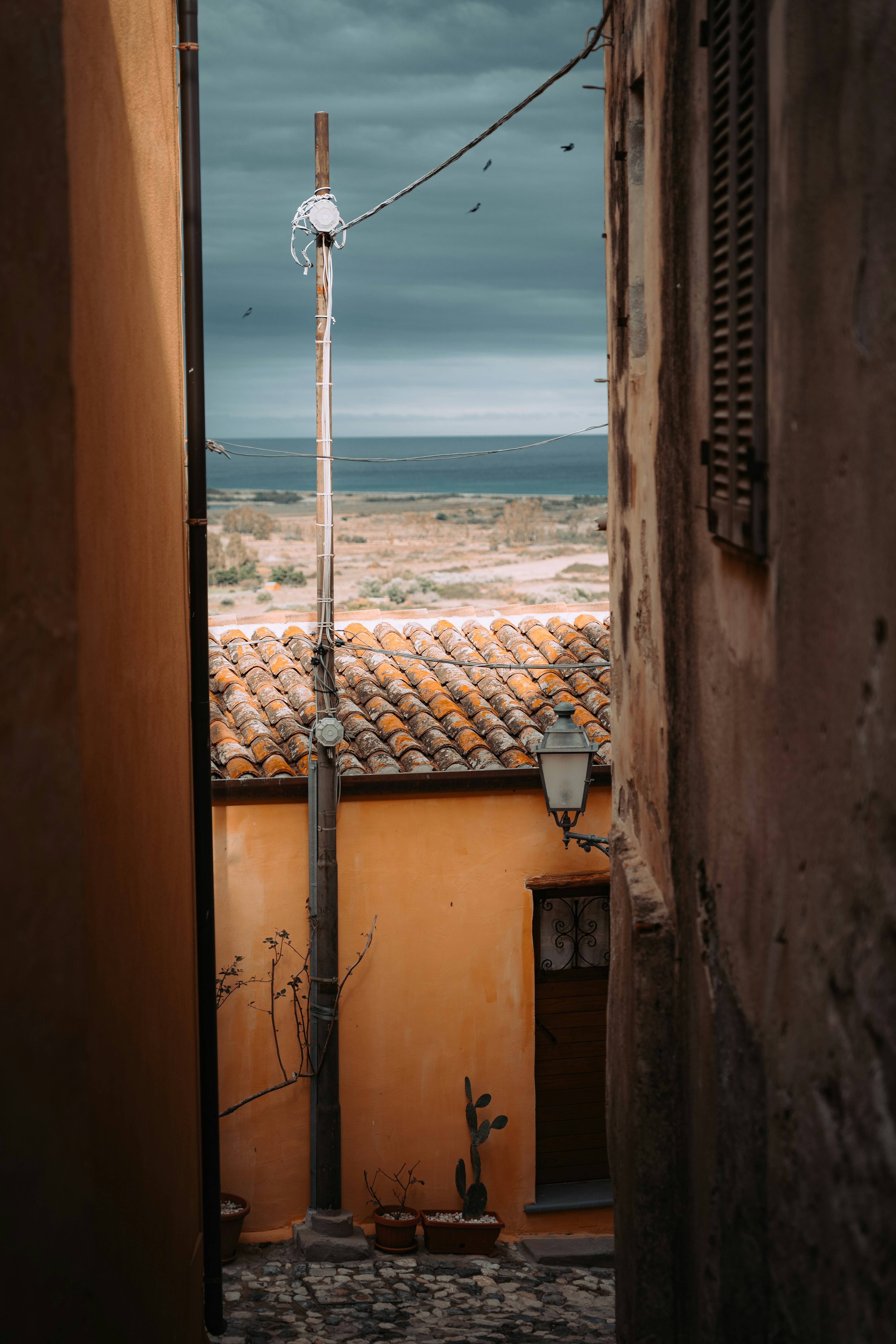 Through the Narrow Arch: A Quiet Corridor to the Distant Sea
