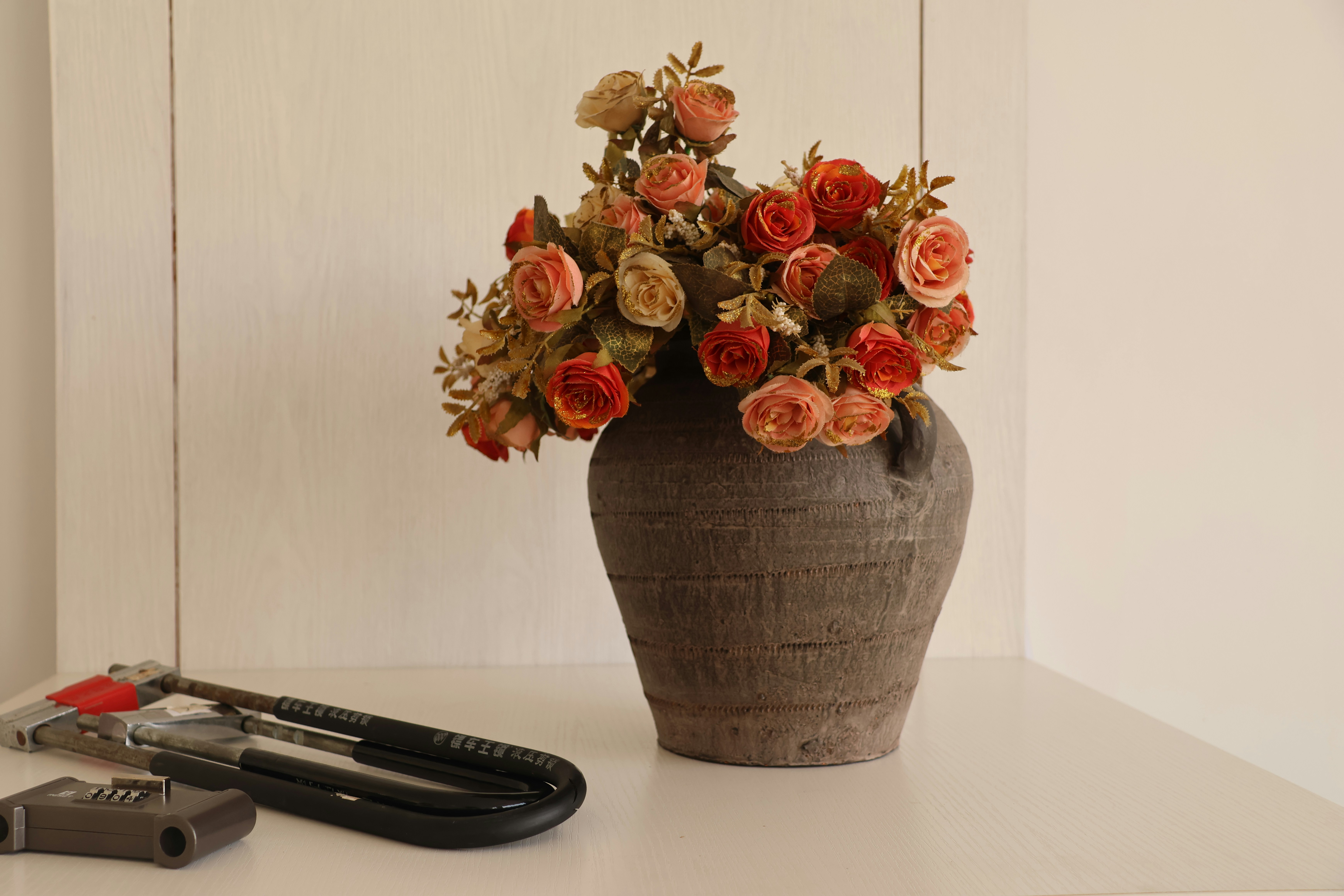 Roses in a Weathered Vase: Quiet Studio Light on a Minimal Still Life