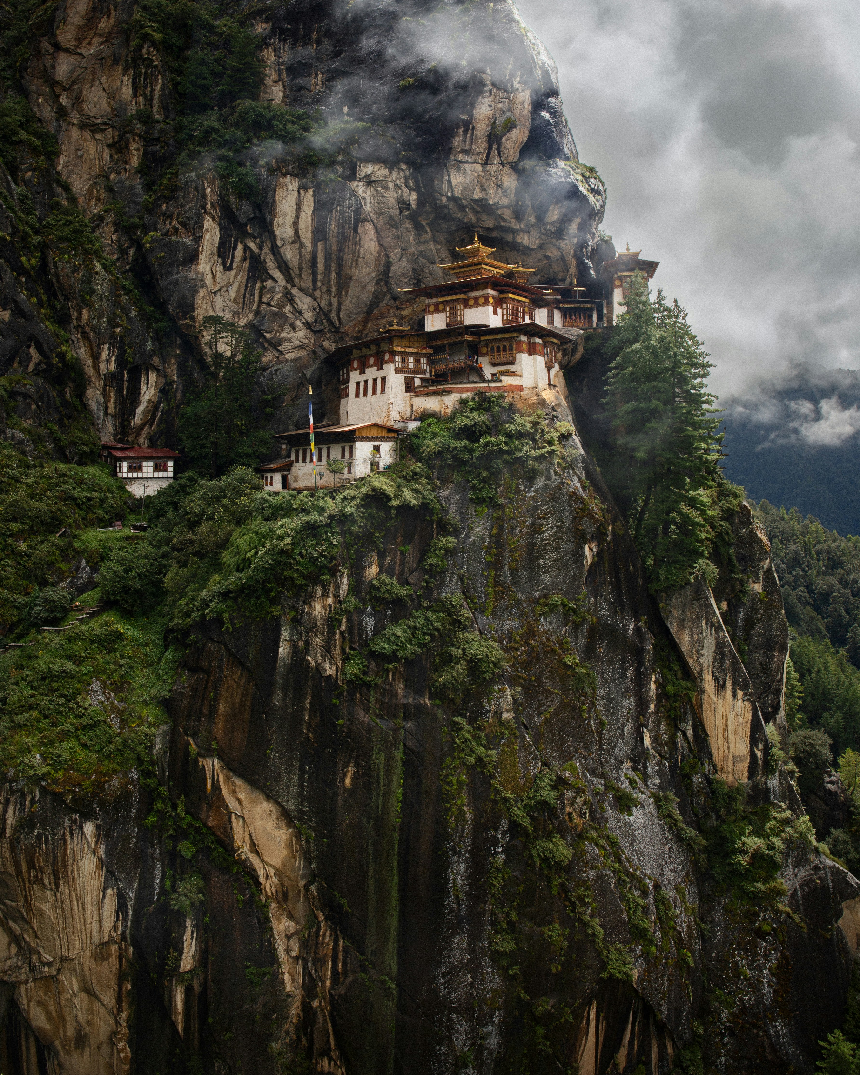 A mountain with a building on top of it photo – Free Bhutan Image on ...
