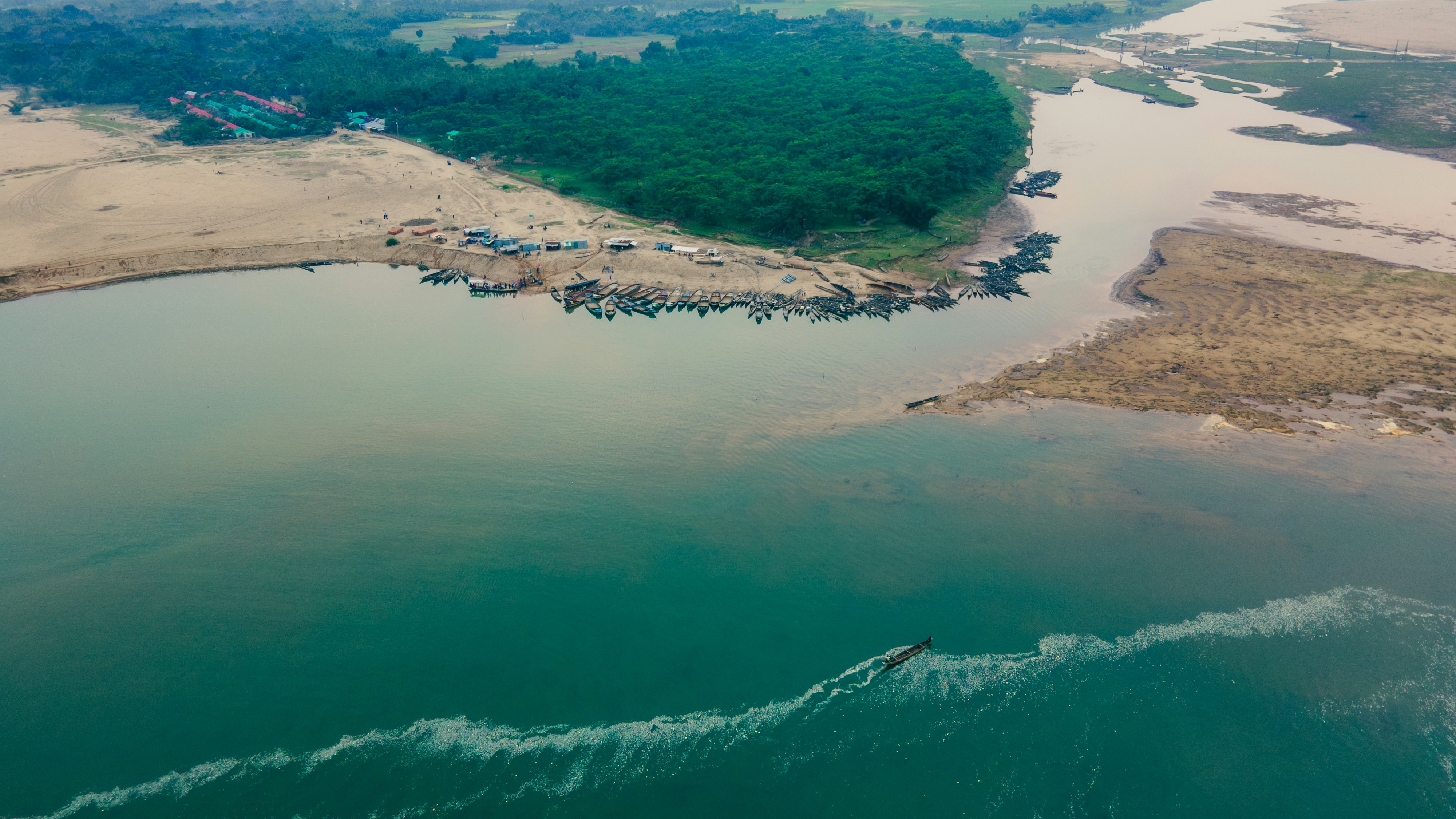 River Delta Awakening: A Drone’s Eye over Tidal Shallows