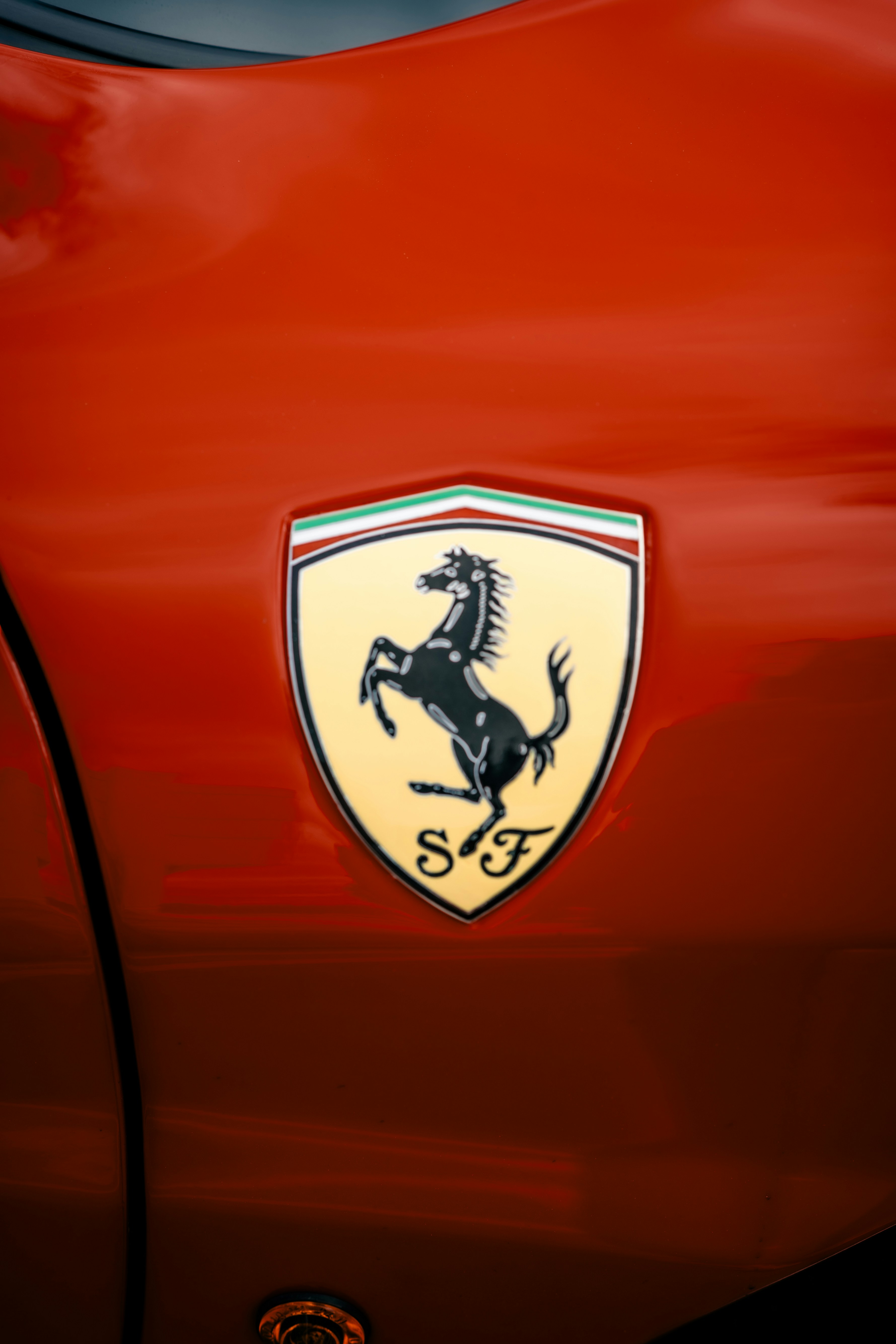 Red-glossed Prancing Crest: Close-up on Ferrari's Horse emblem