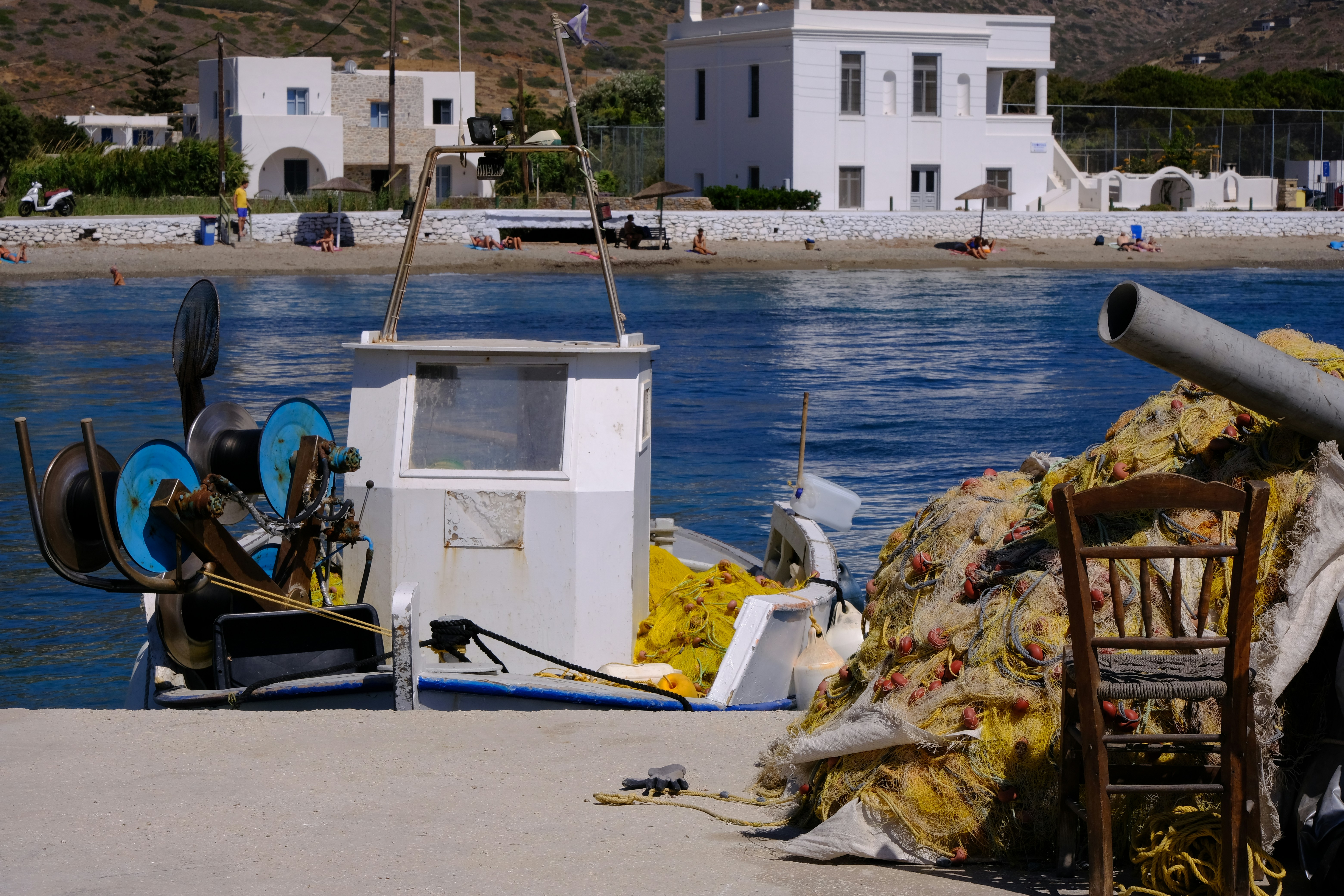 Harbor Workday: Nets, Crates, and the Quiet Dunes