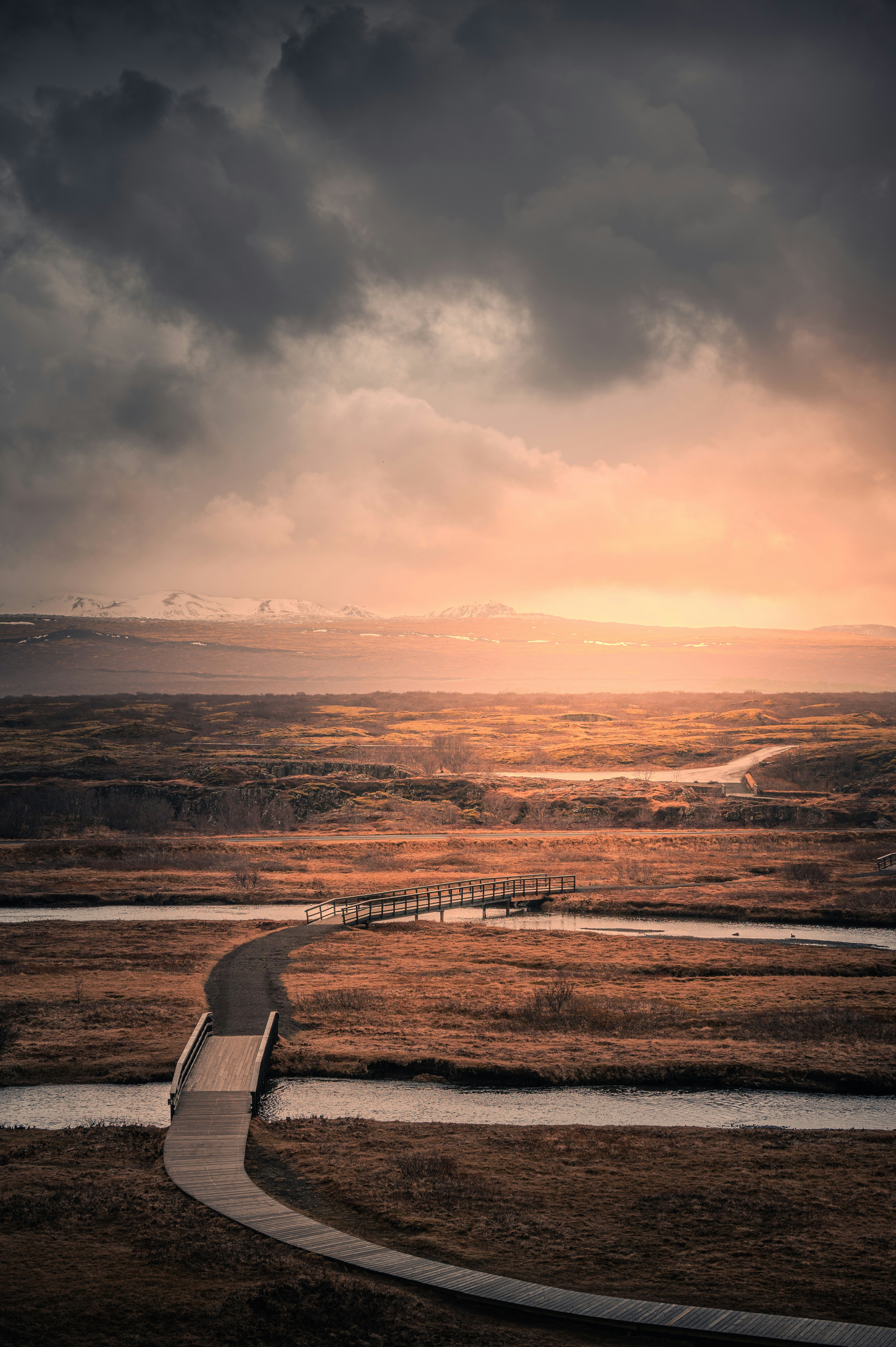 Sunset Spiral: A Winding Boardwalk Through a Moody Marsh