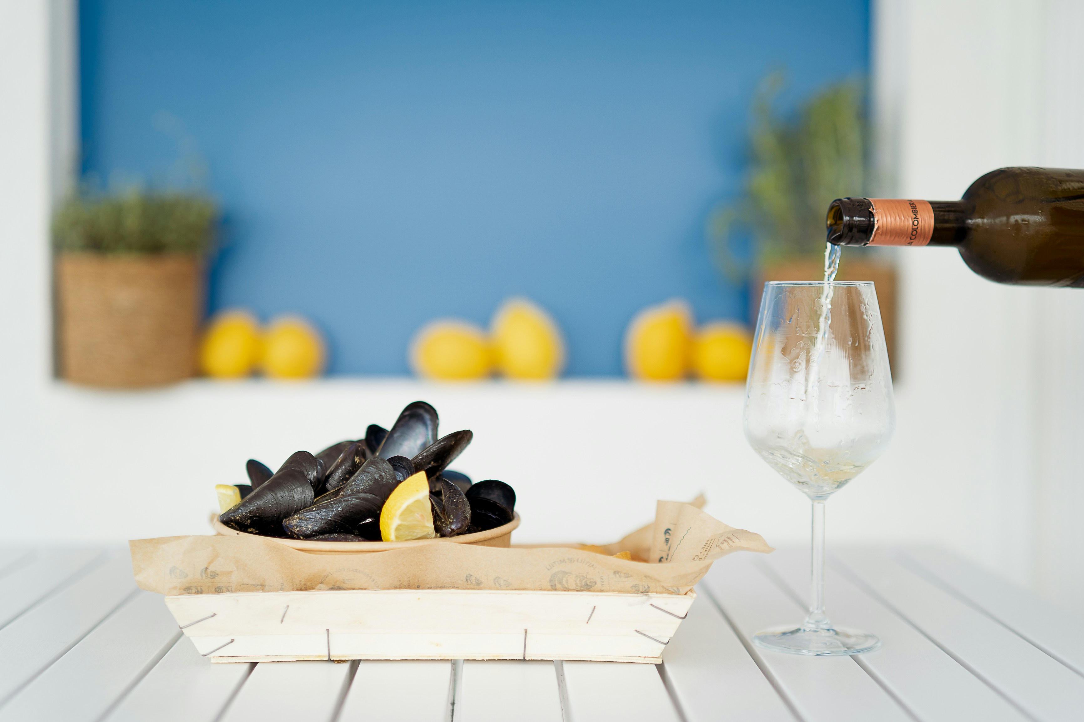 Lemon Mussels and a Toast: Glassy Pour Over a Light-Backed Deck