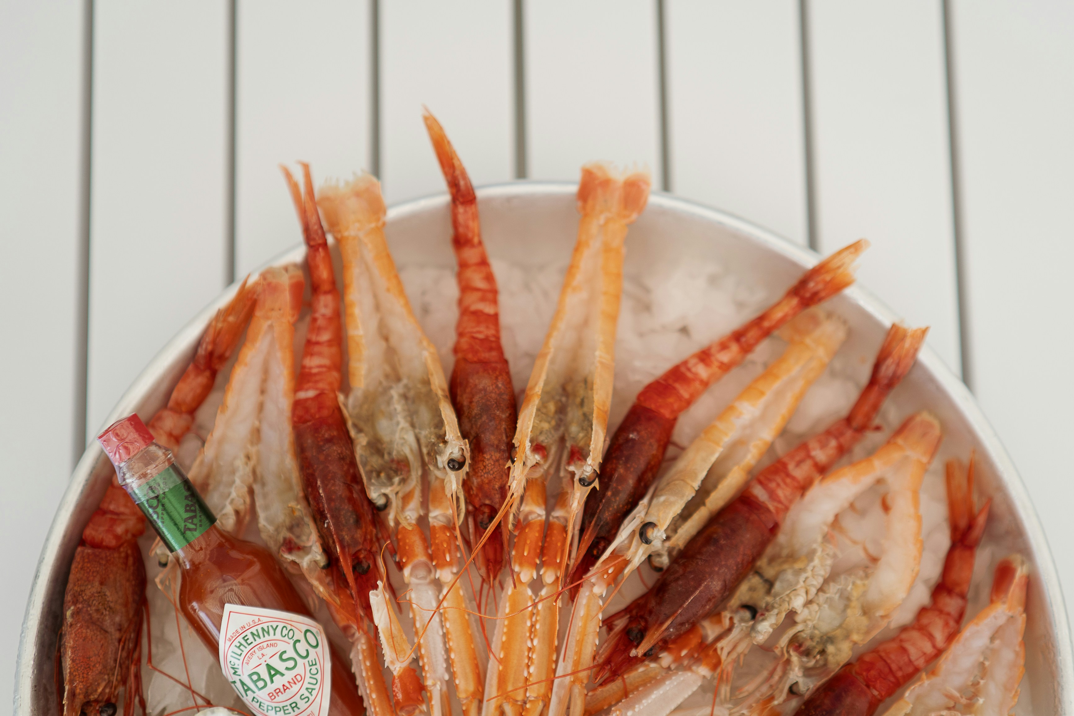 A white plate topped with lots of shrimp photo – Free Food Image on ...