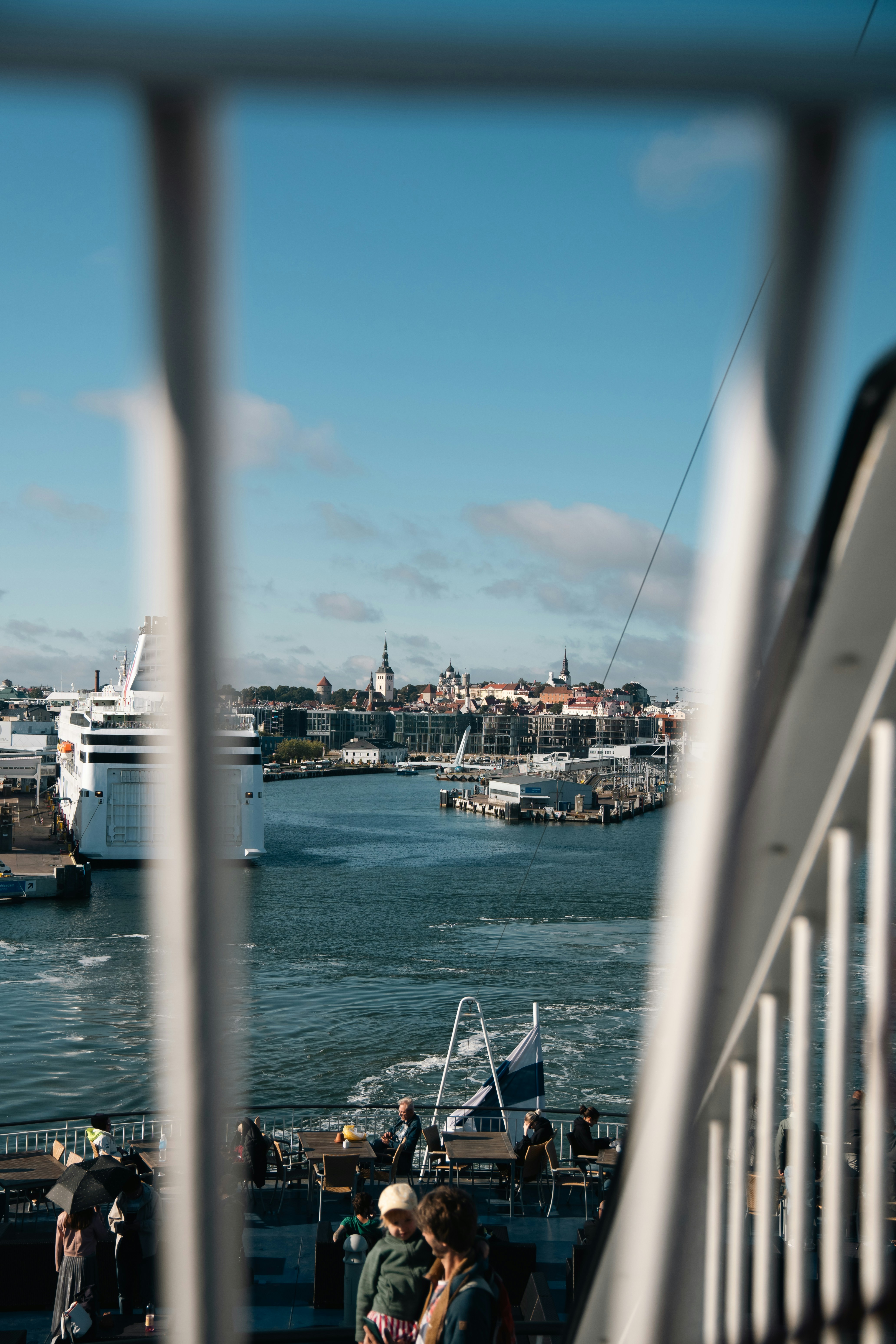 Framed Harbor: City Skyline Beyond the Railings