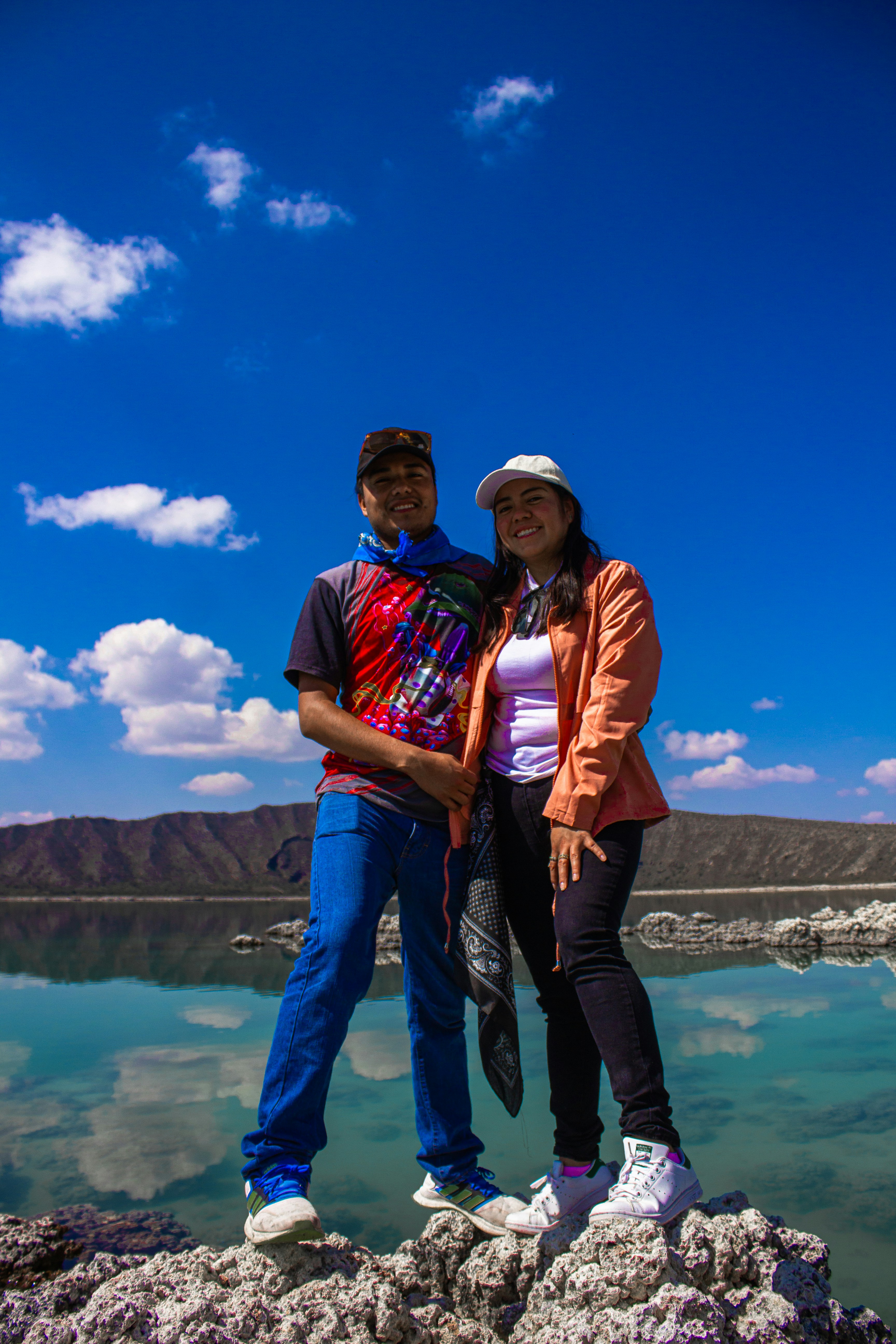 Sunlit Duo by the Caldera: A Moment of Ridge and Reflection