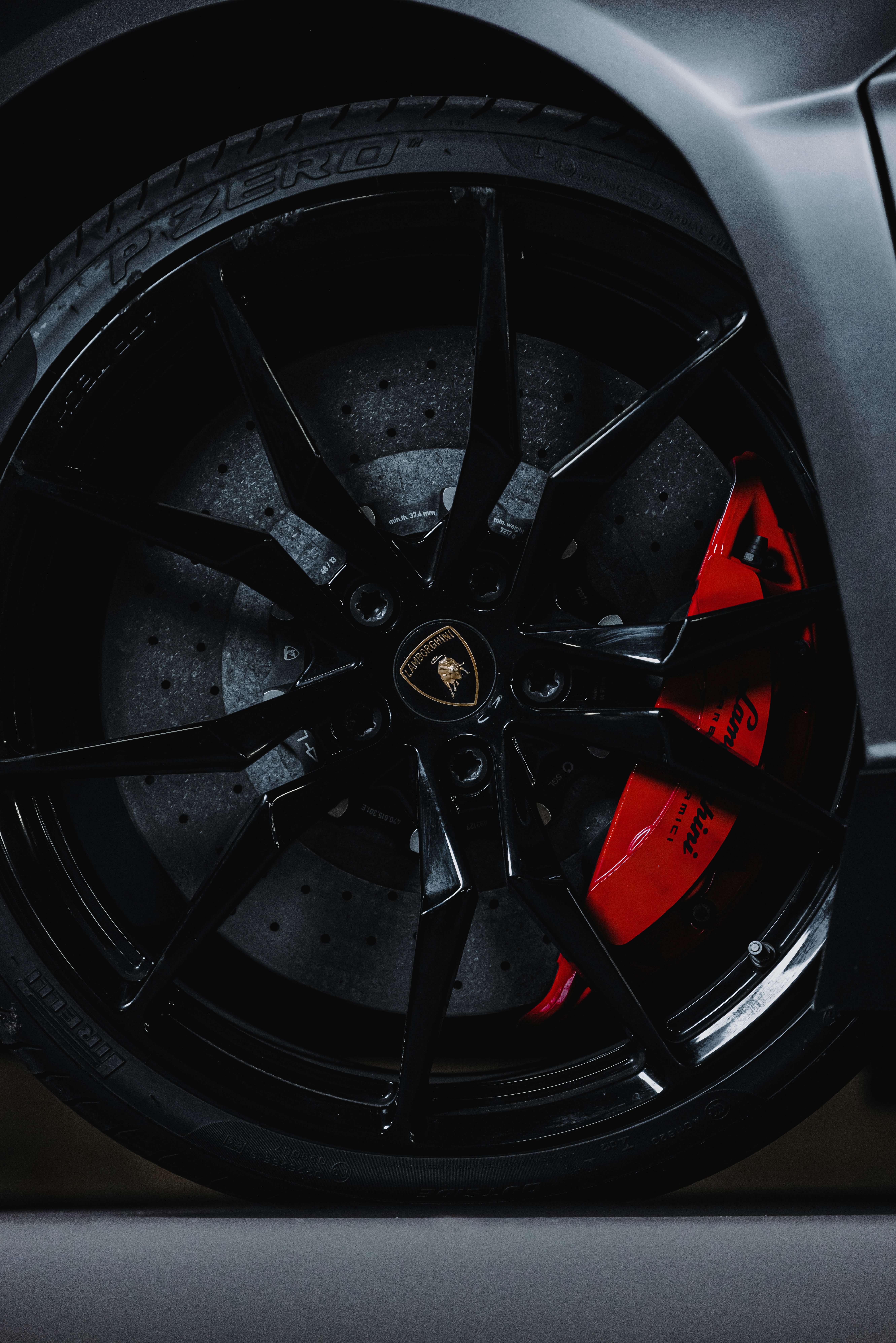 A close up of a car wheel with red spokes photo – Free Machine Image on ...