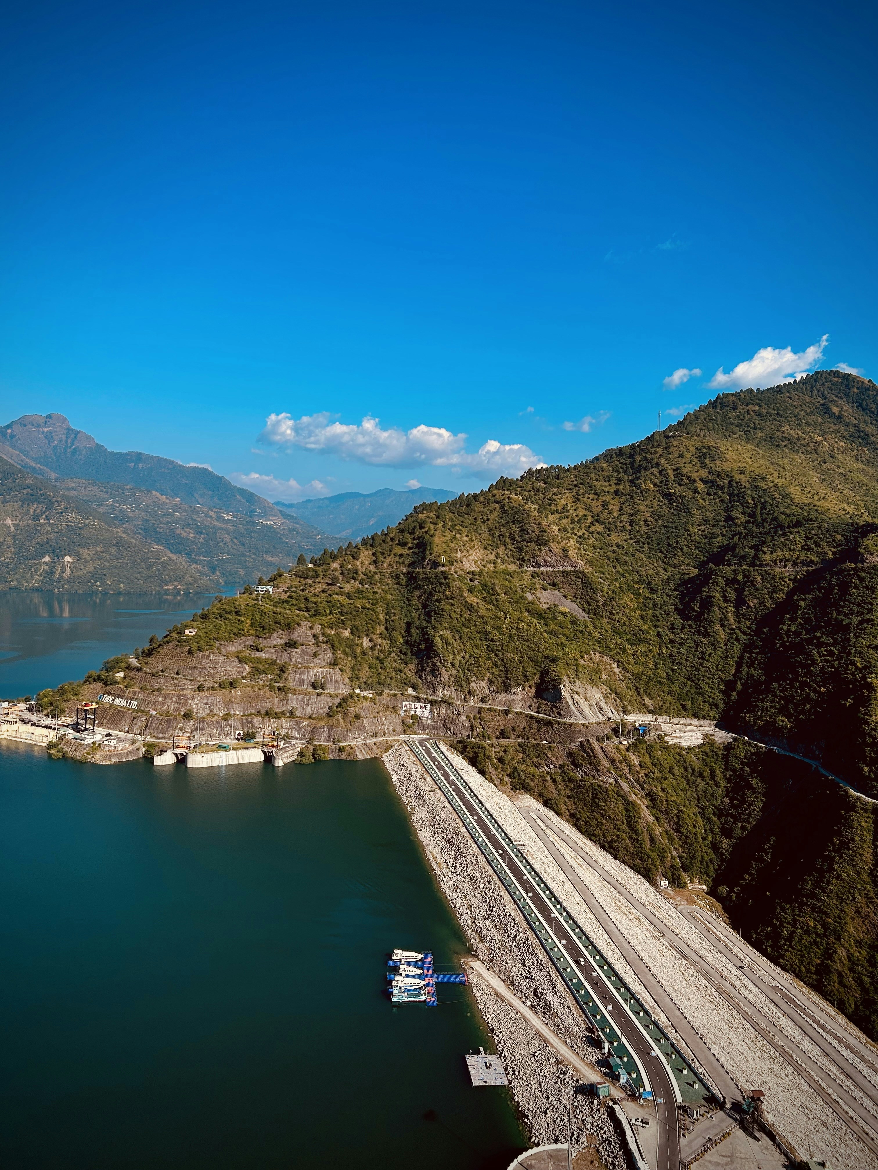 Bridged Serpentine Pass over a Mountain Lake