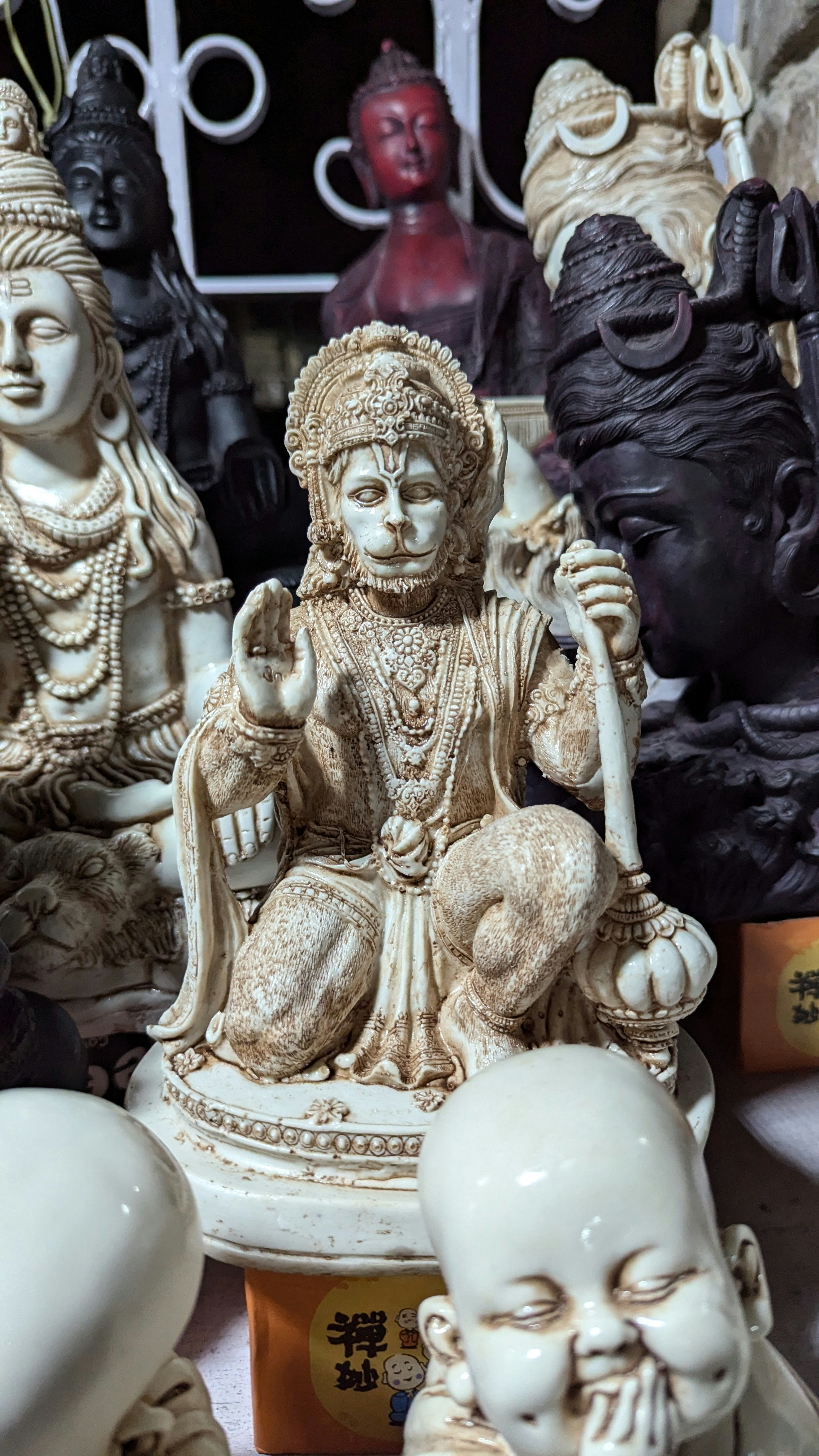 A group of statues sitting on top of a table photo – Free Nainital ...
