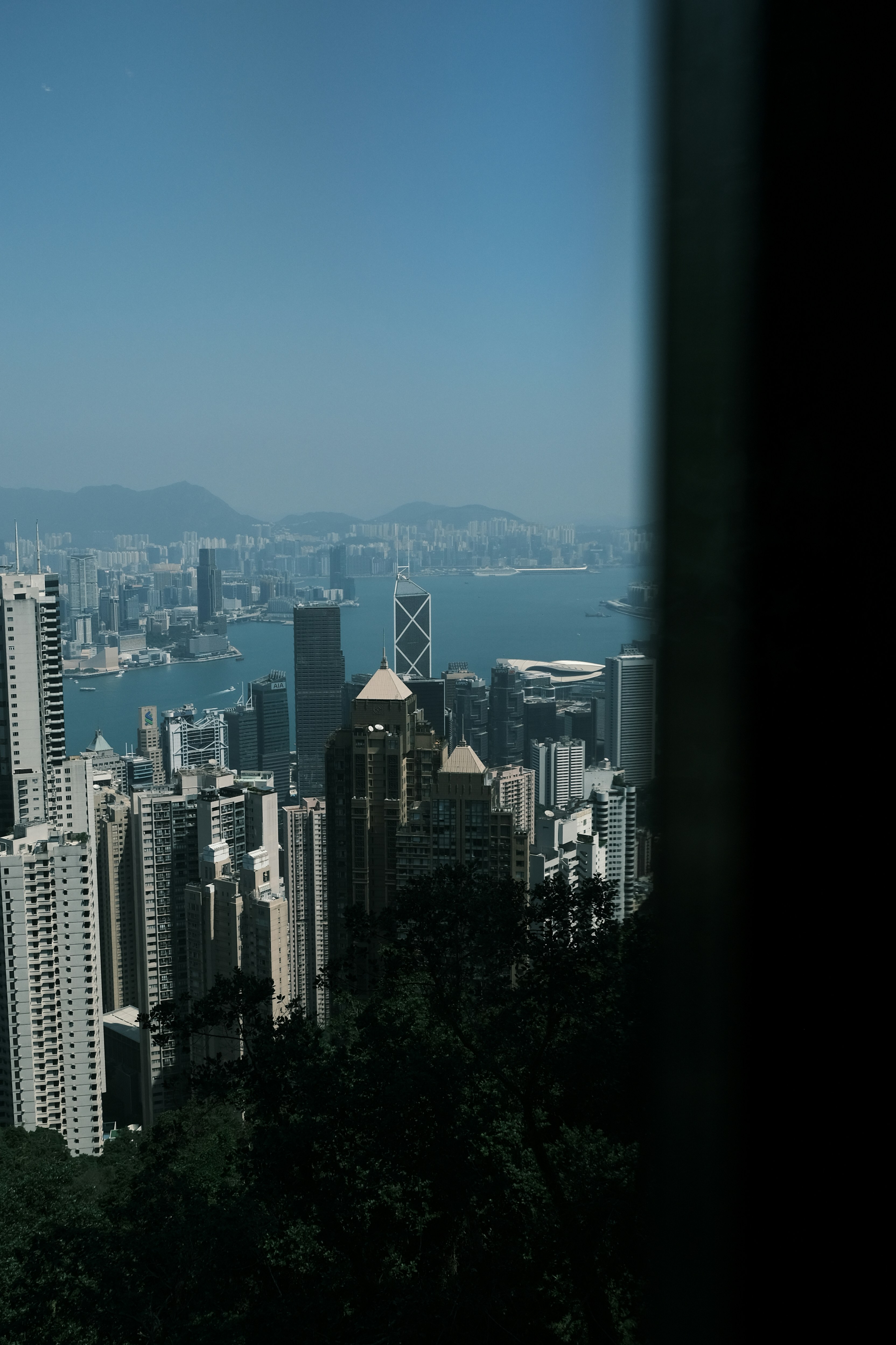A view of a city from a window photo – Free Building Image on Unsplash