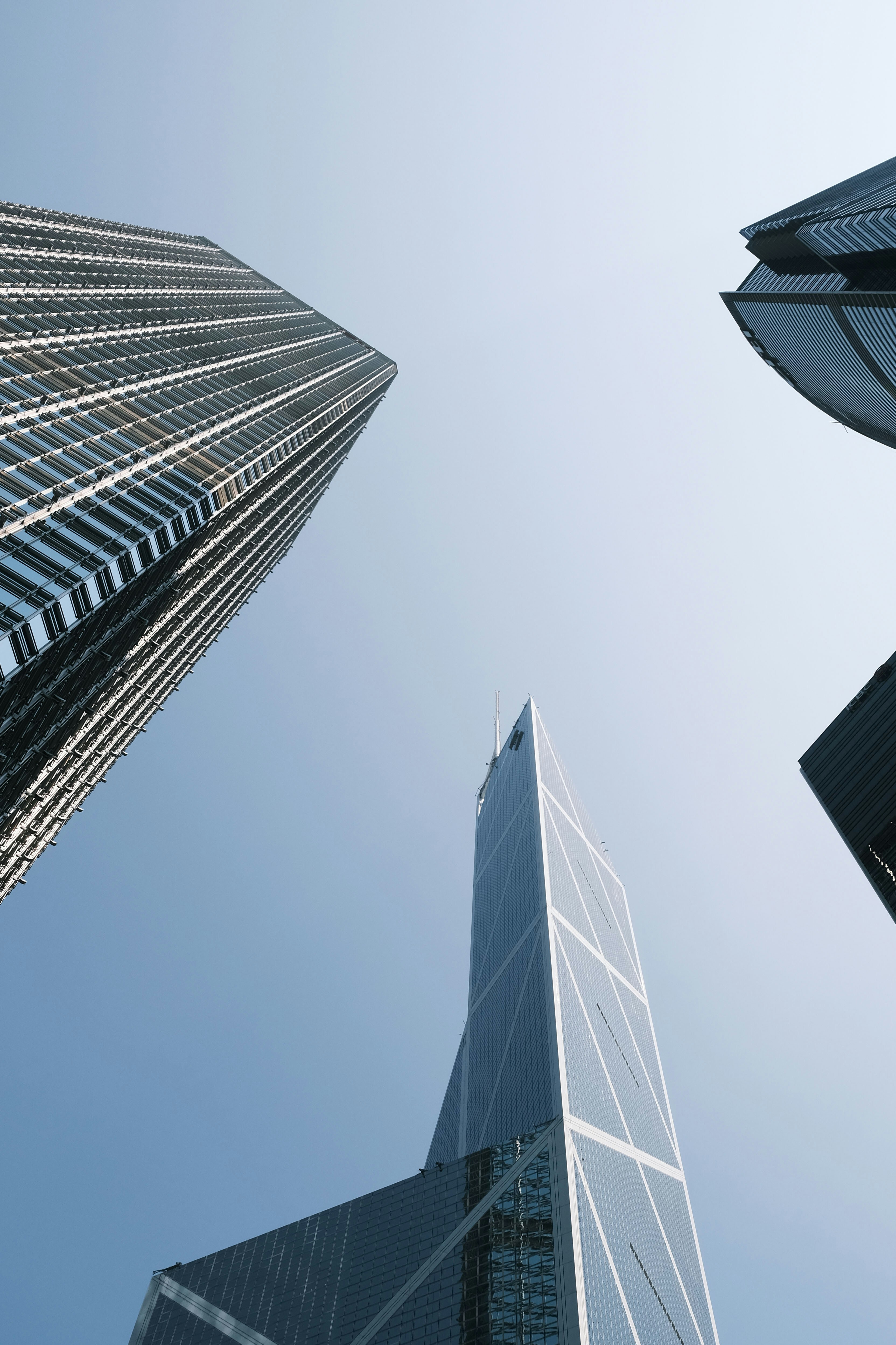 Looking up at tall buildings in a city photo – Free Building Image on ...