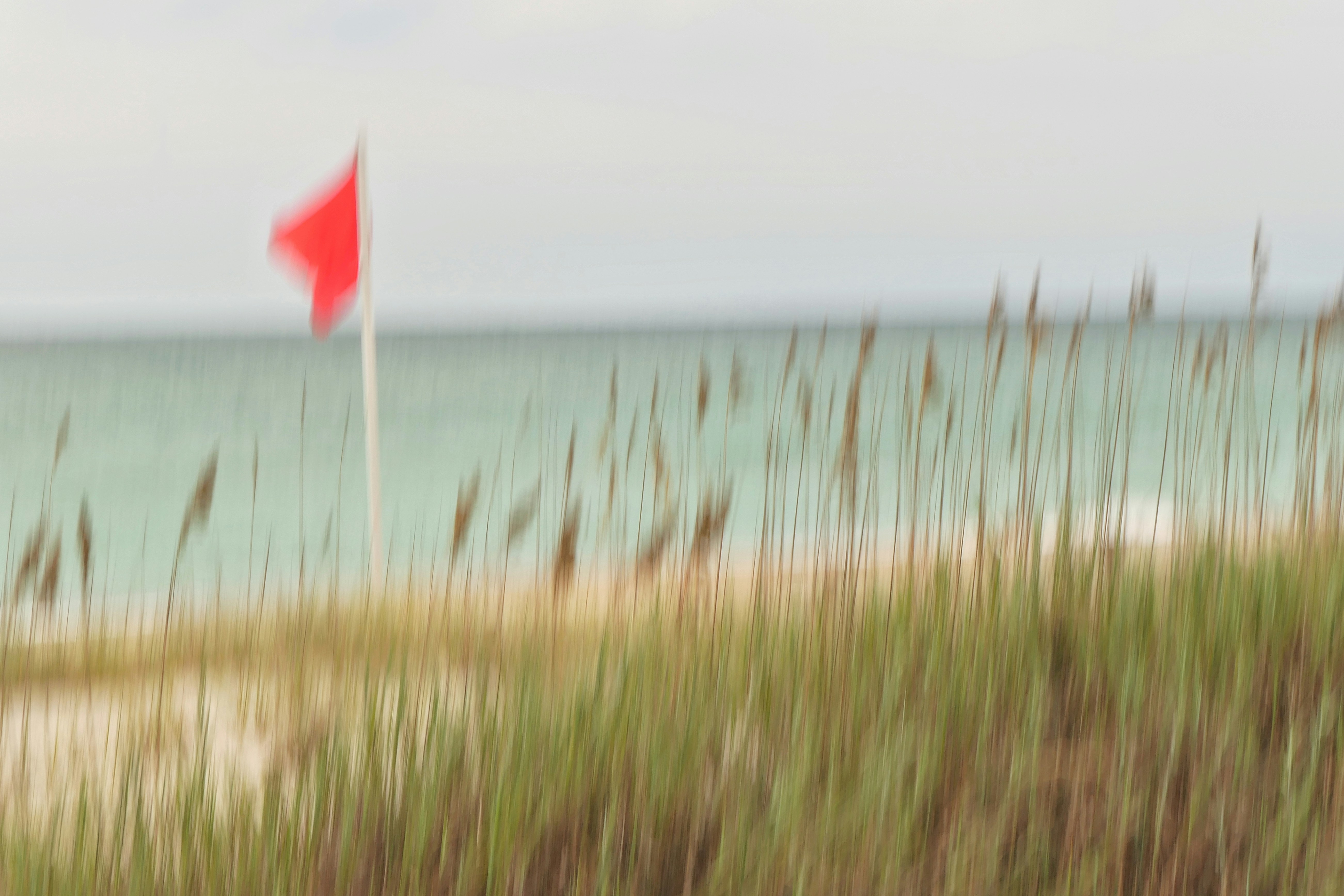 warning flag on beach with ICM
