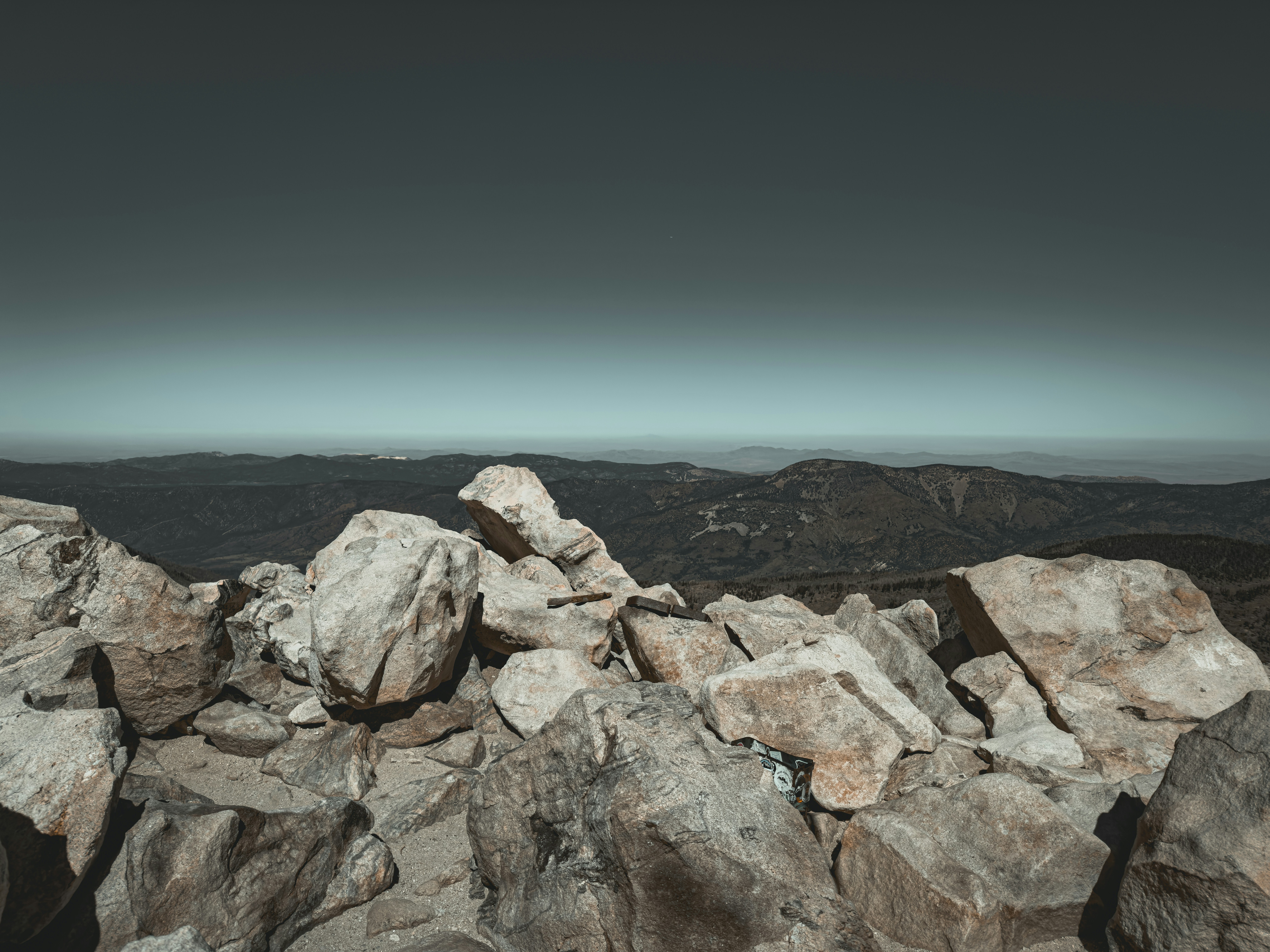 A large pile of rocks sitting on top of a mountain