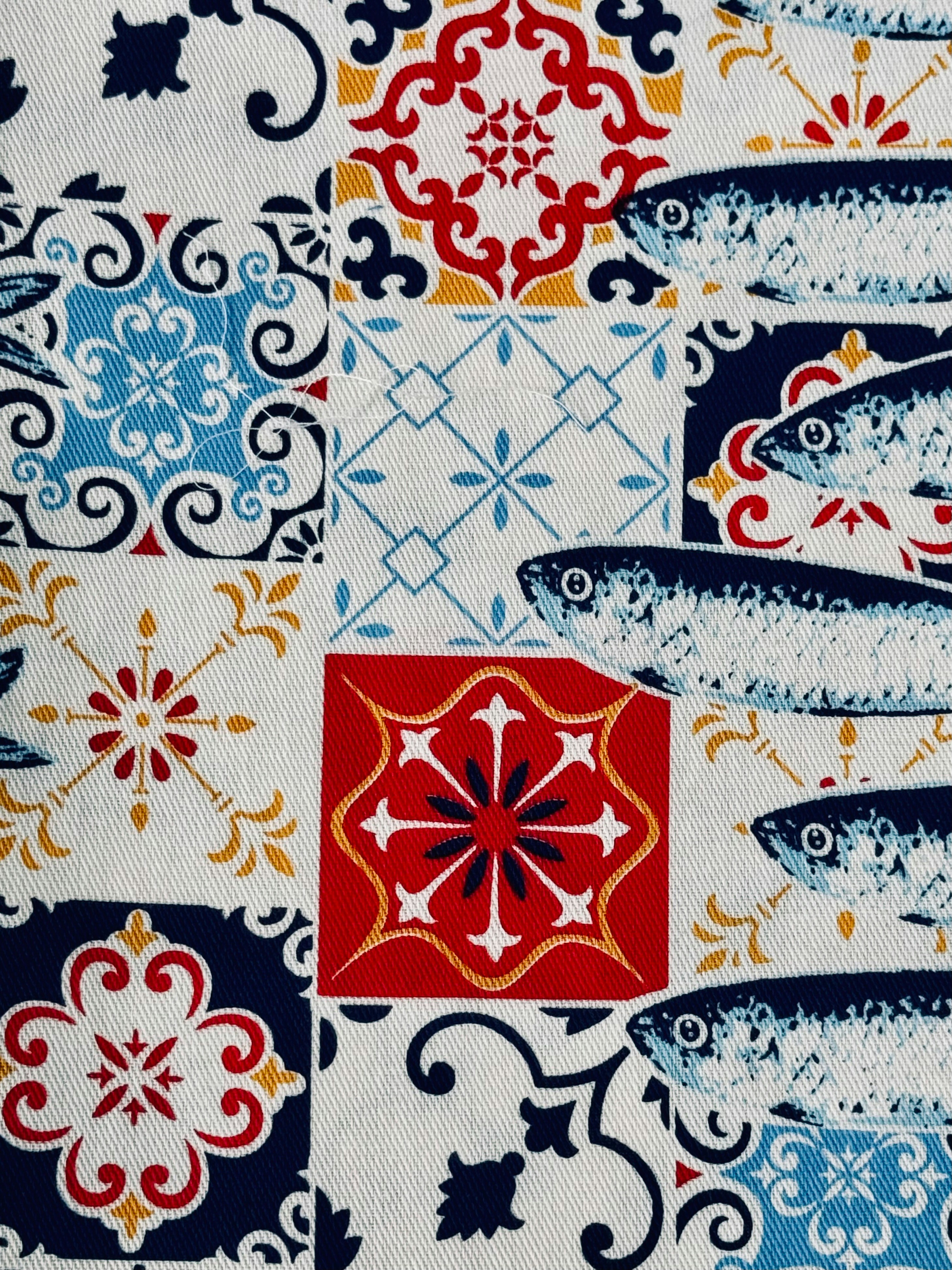 Centerpiece Red Tile Anchors a Tapestry of Fish and Florals