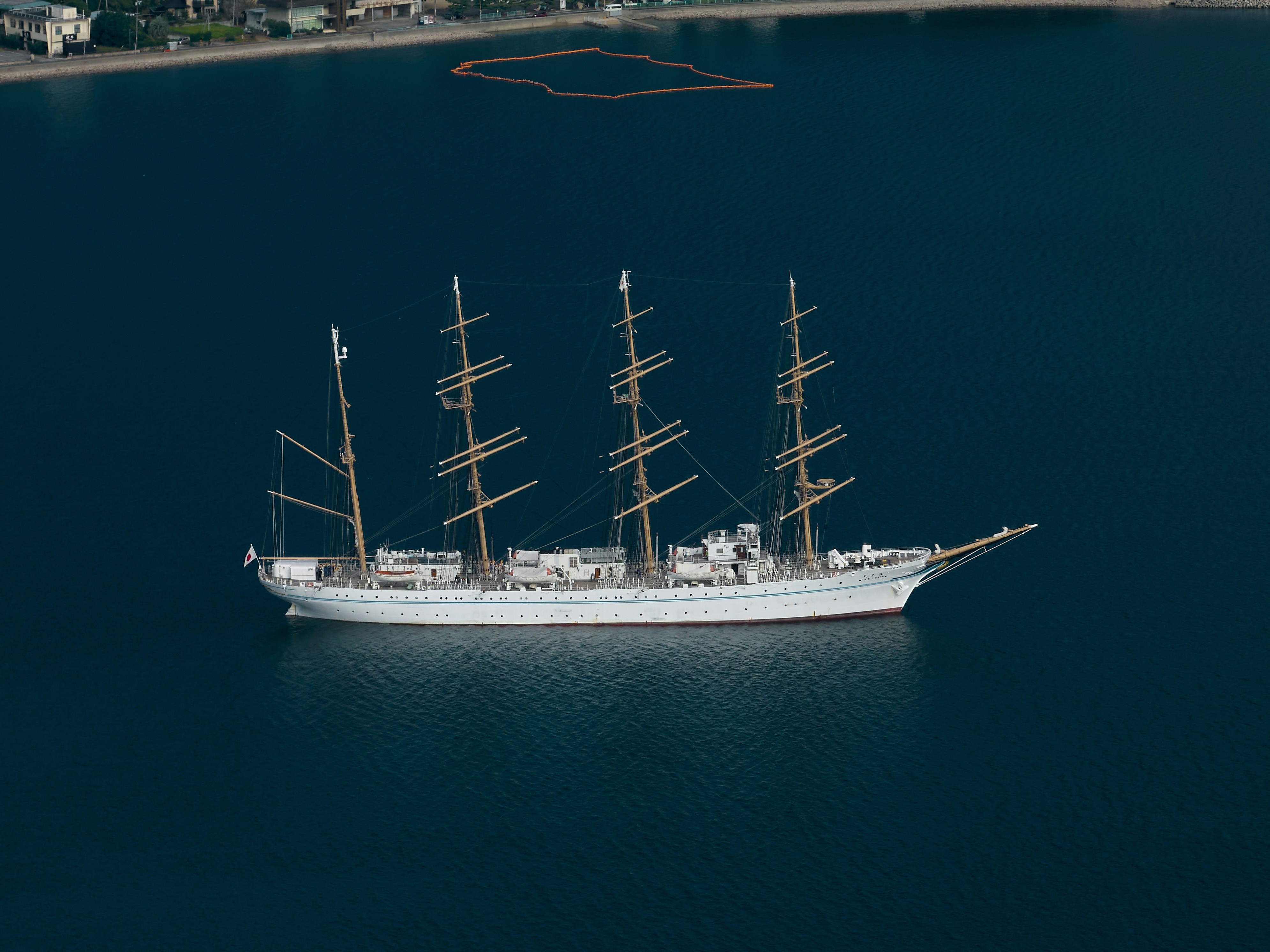 A large white ship floating on top of a large body of water photo ...