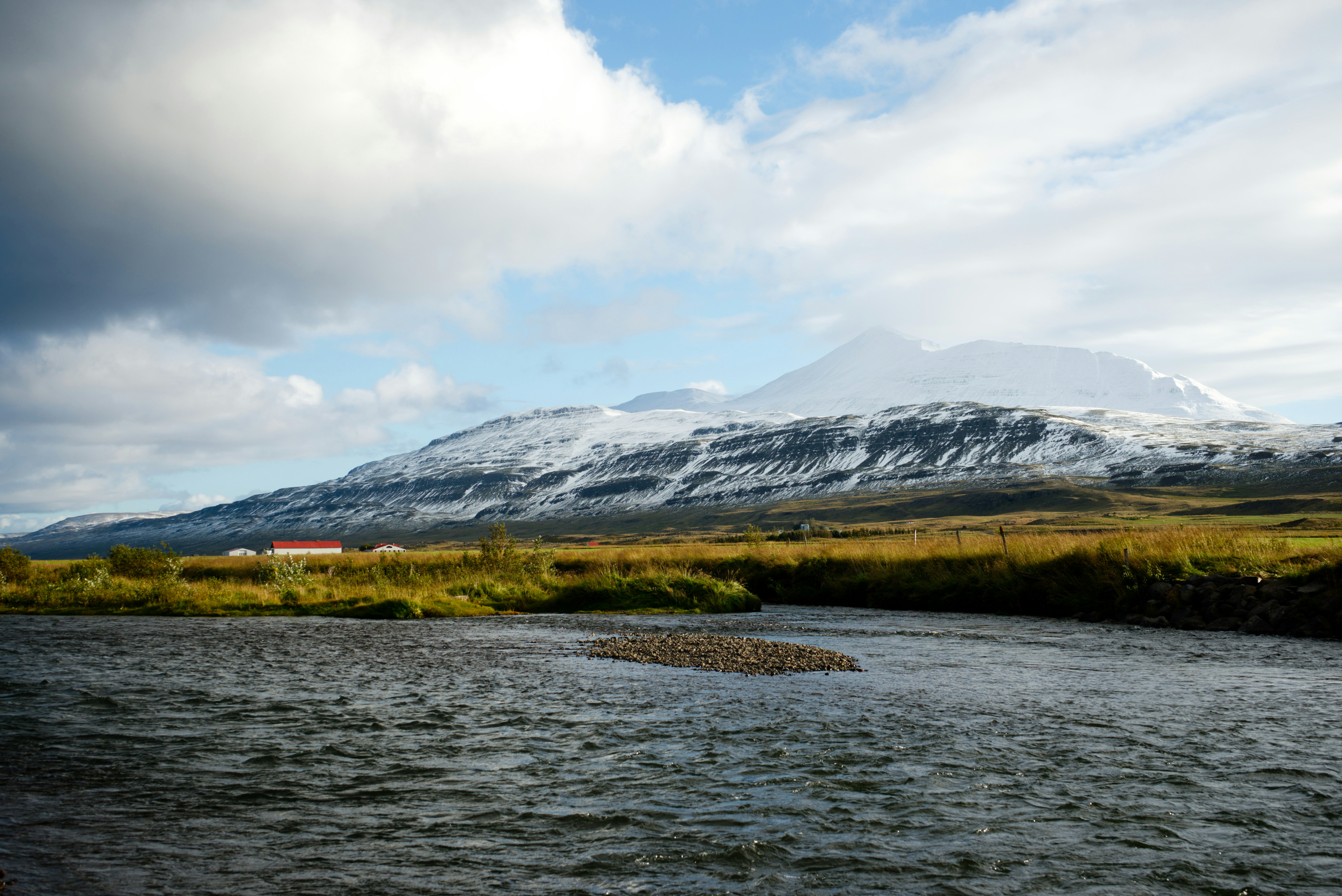 A river with a mountain in the background photo – Free Land Image on ...