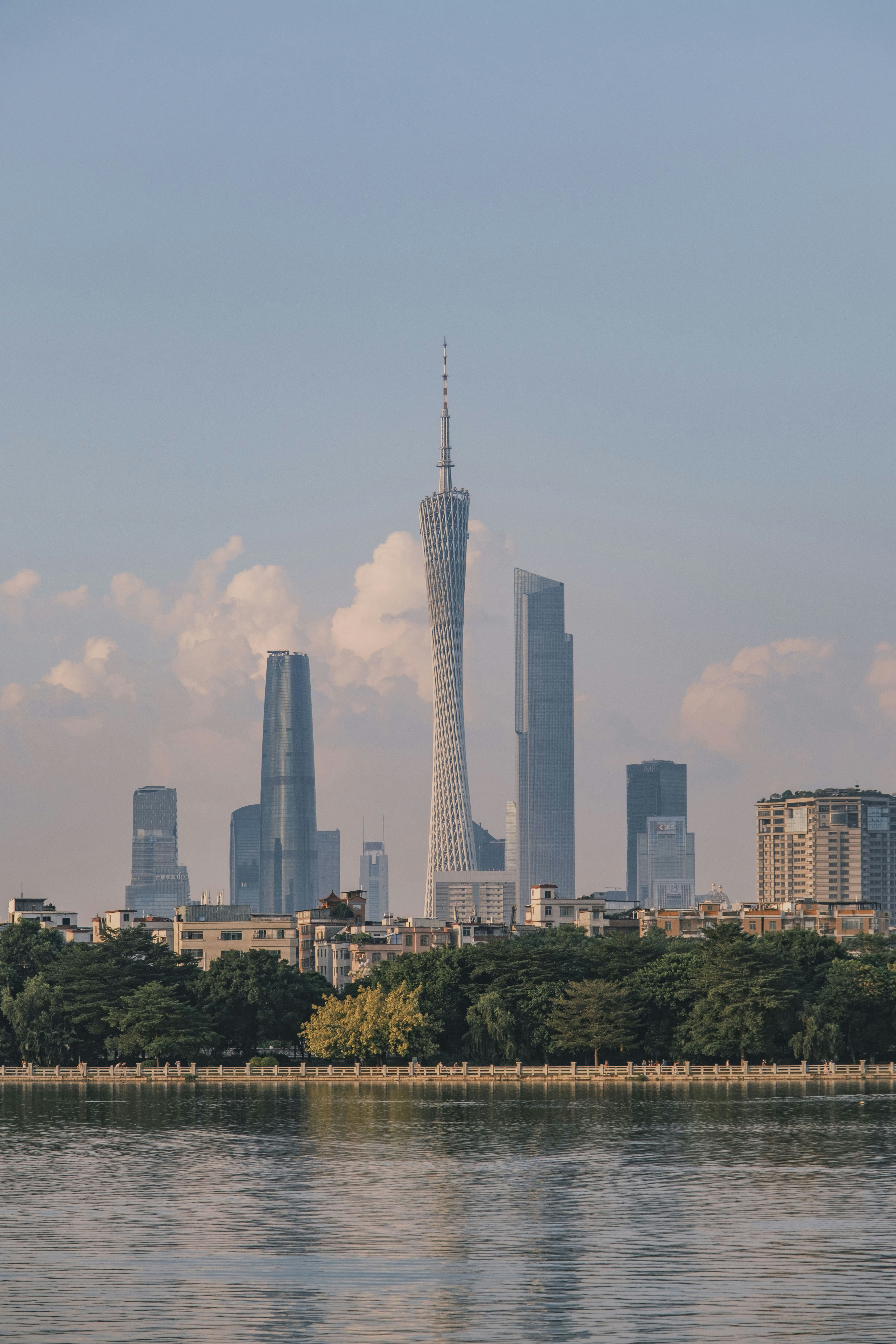 A large body of water with a city in the background