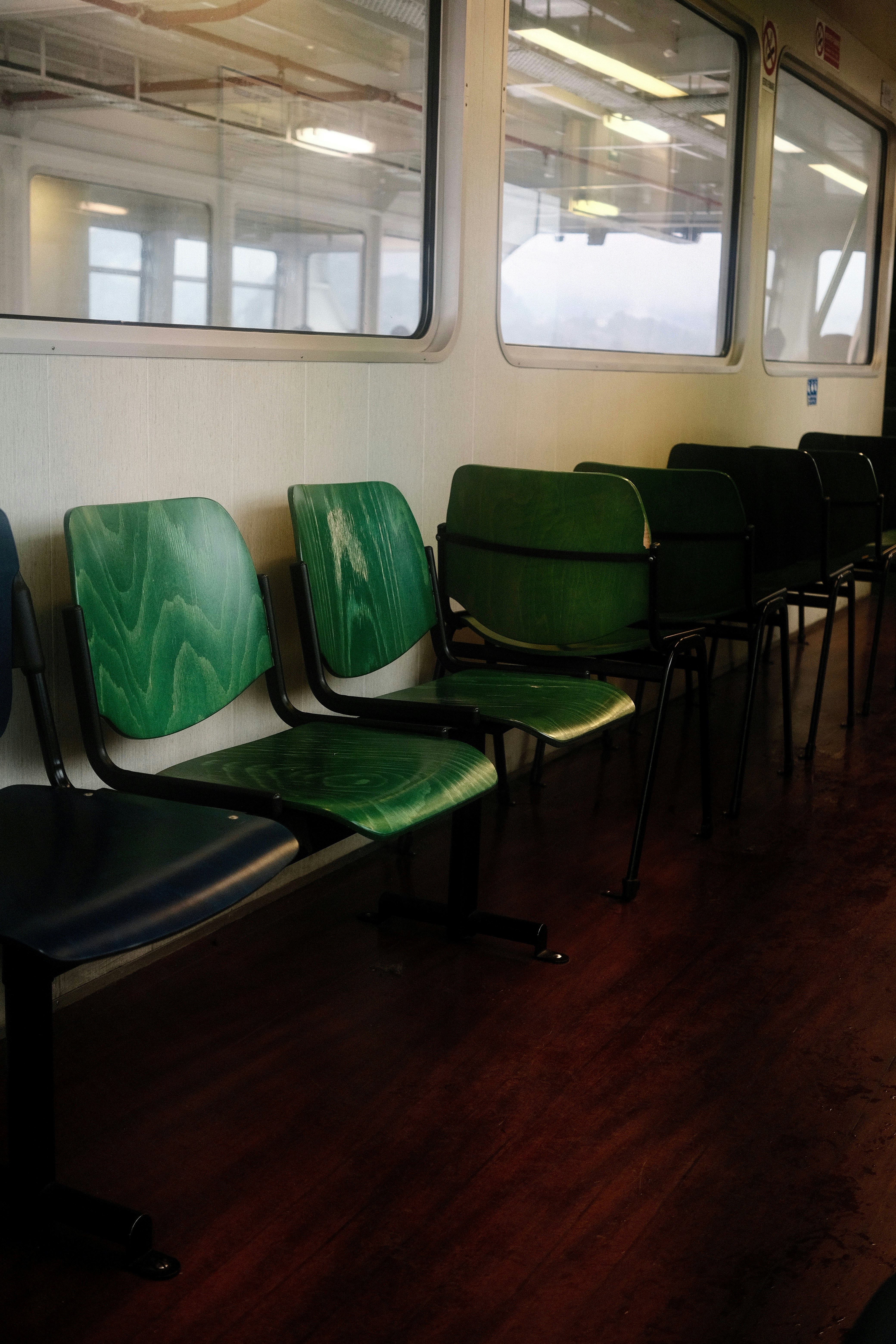 Emerald Rows in a Quiet Subway Car