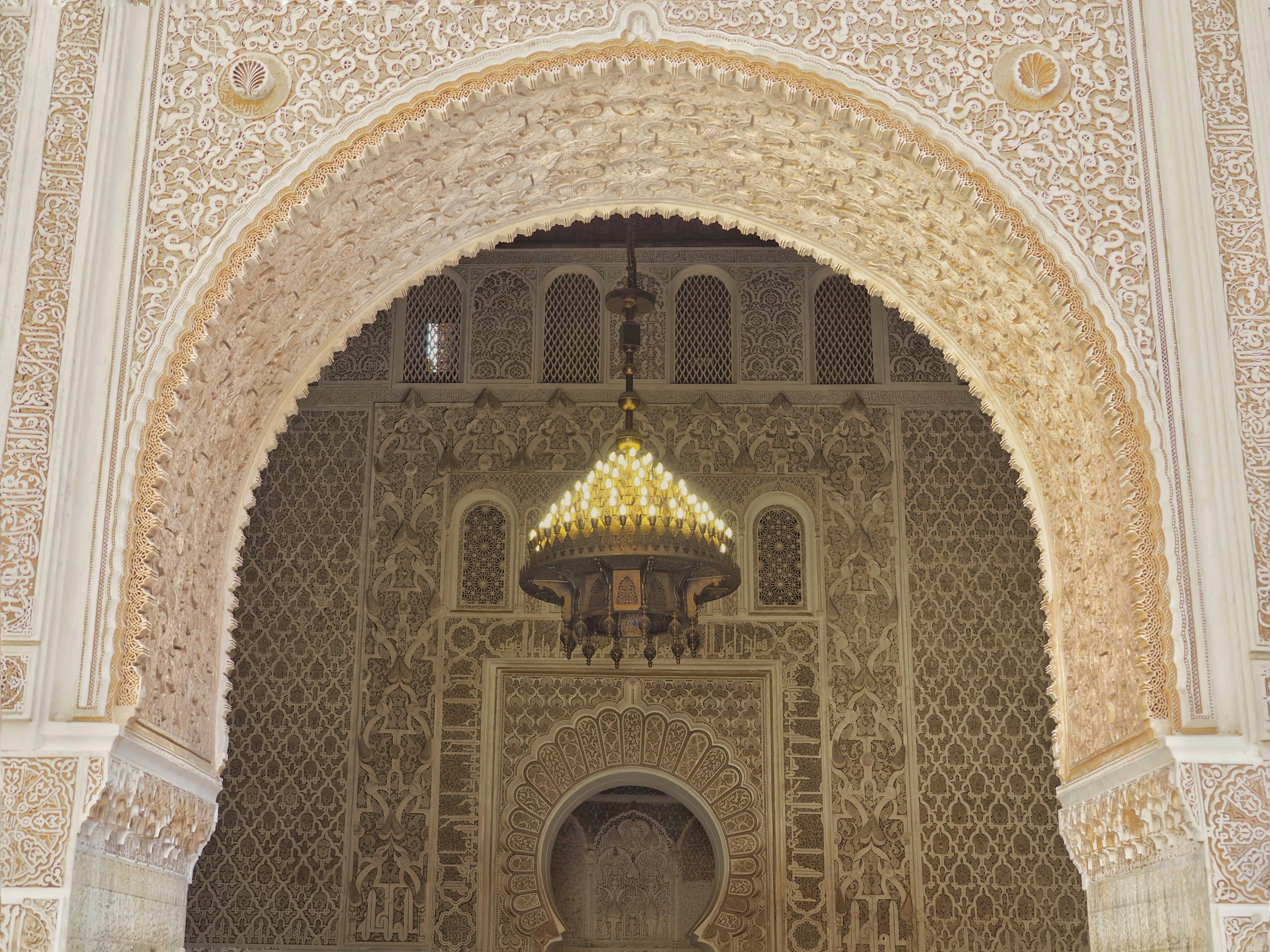 A large building with a clock on the wall photo – Free Morocco Image on ...
