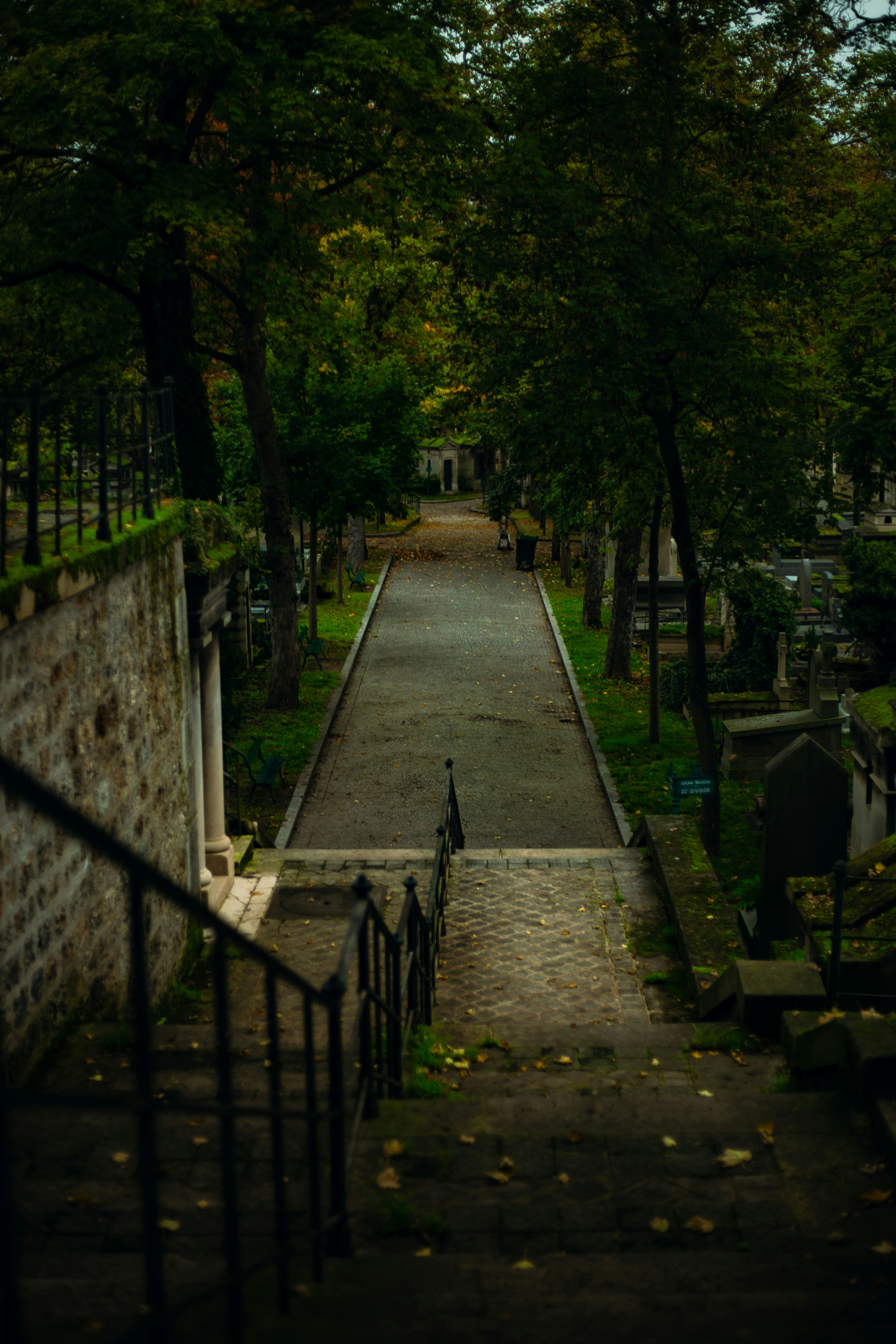 A cemetery with a clock on the top of it photo – Free Simetric Image on ...