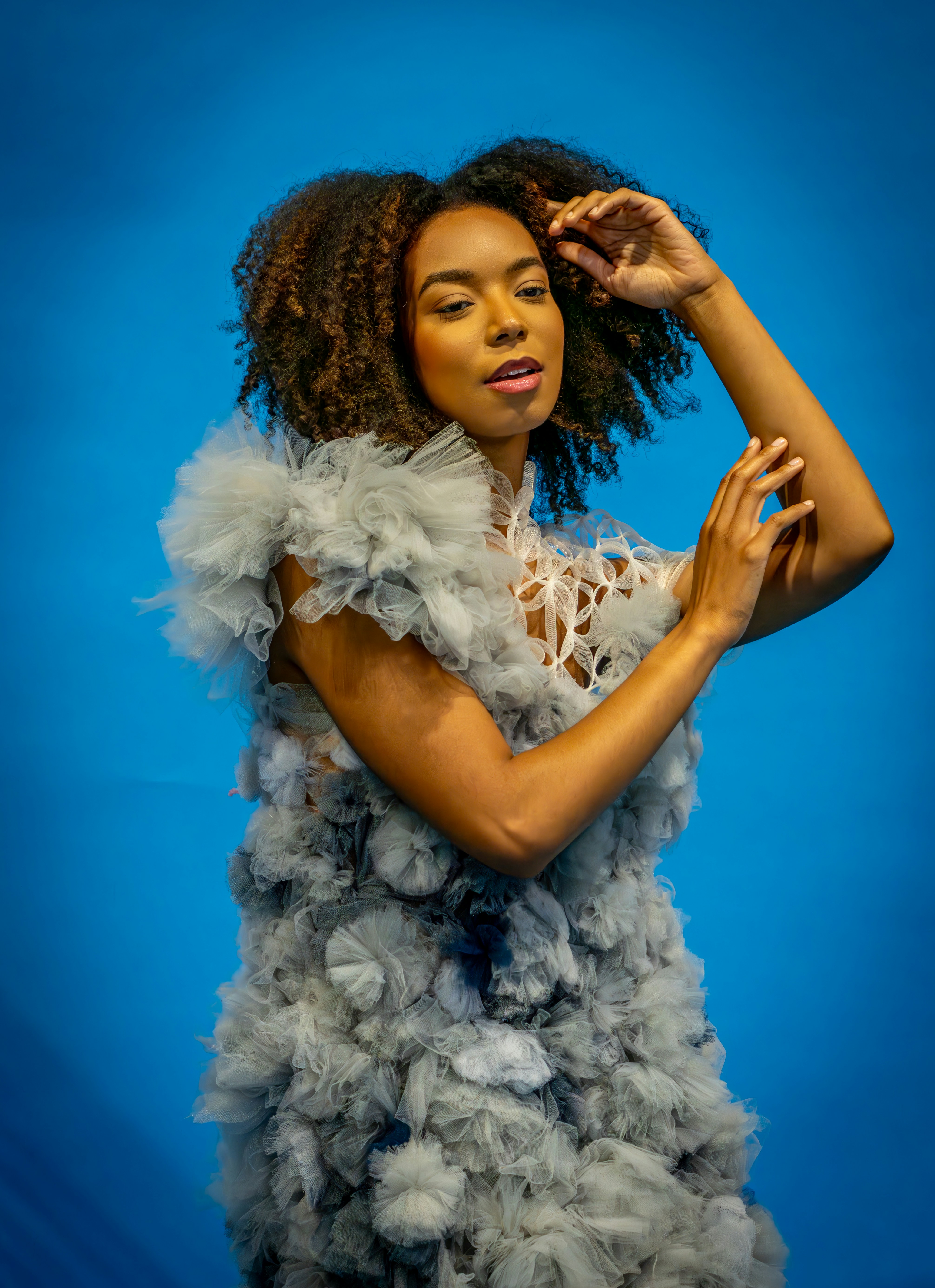 Cloud-Couture Portrait in Indigo Studio Light