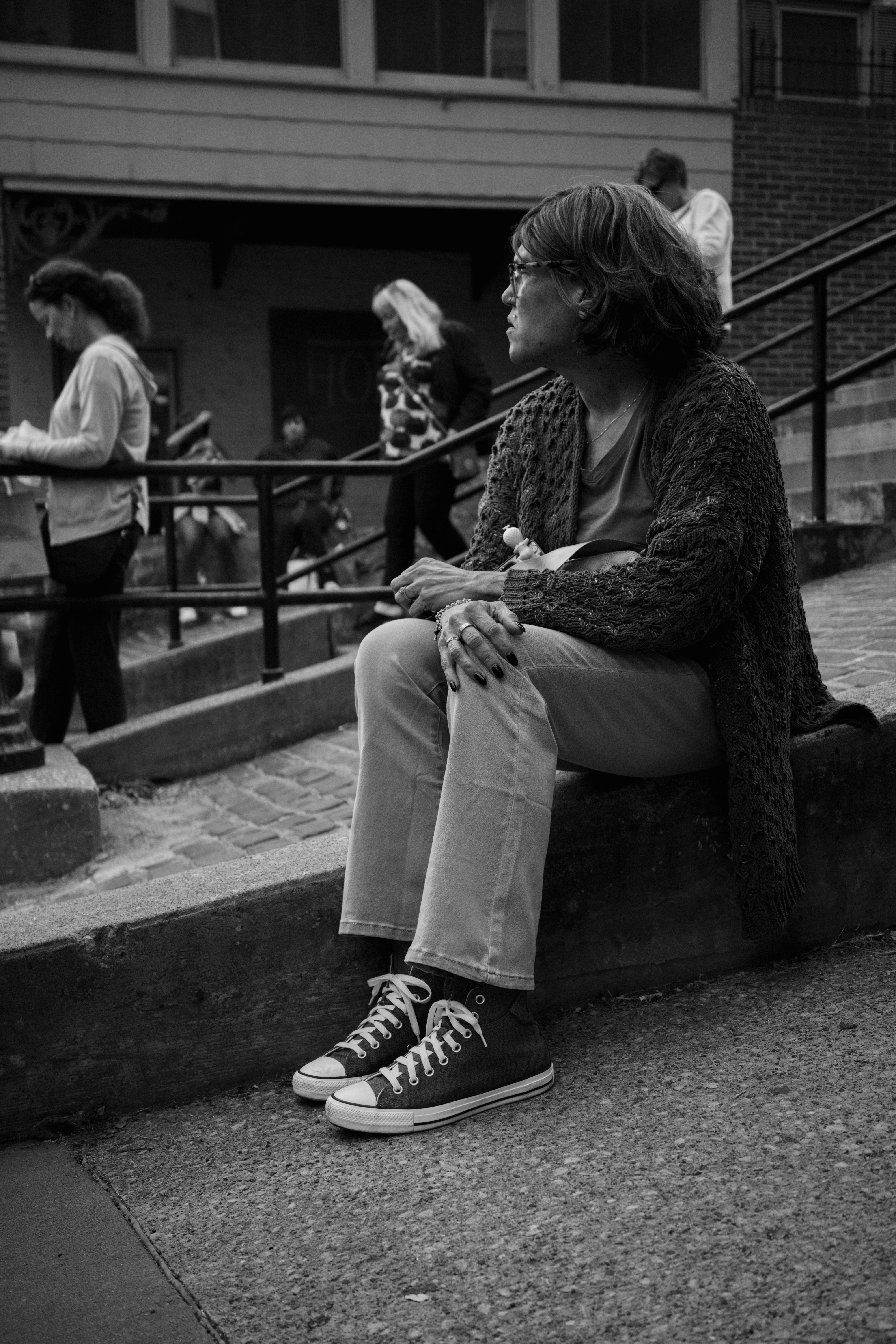 On the Edge of the Frame: A Quiet Vigil on City Steps