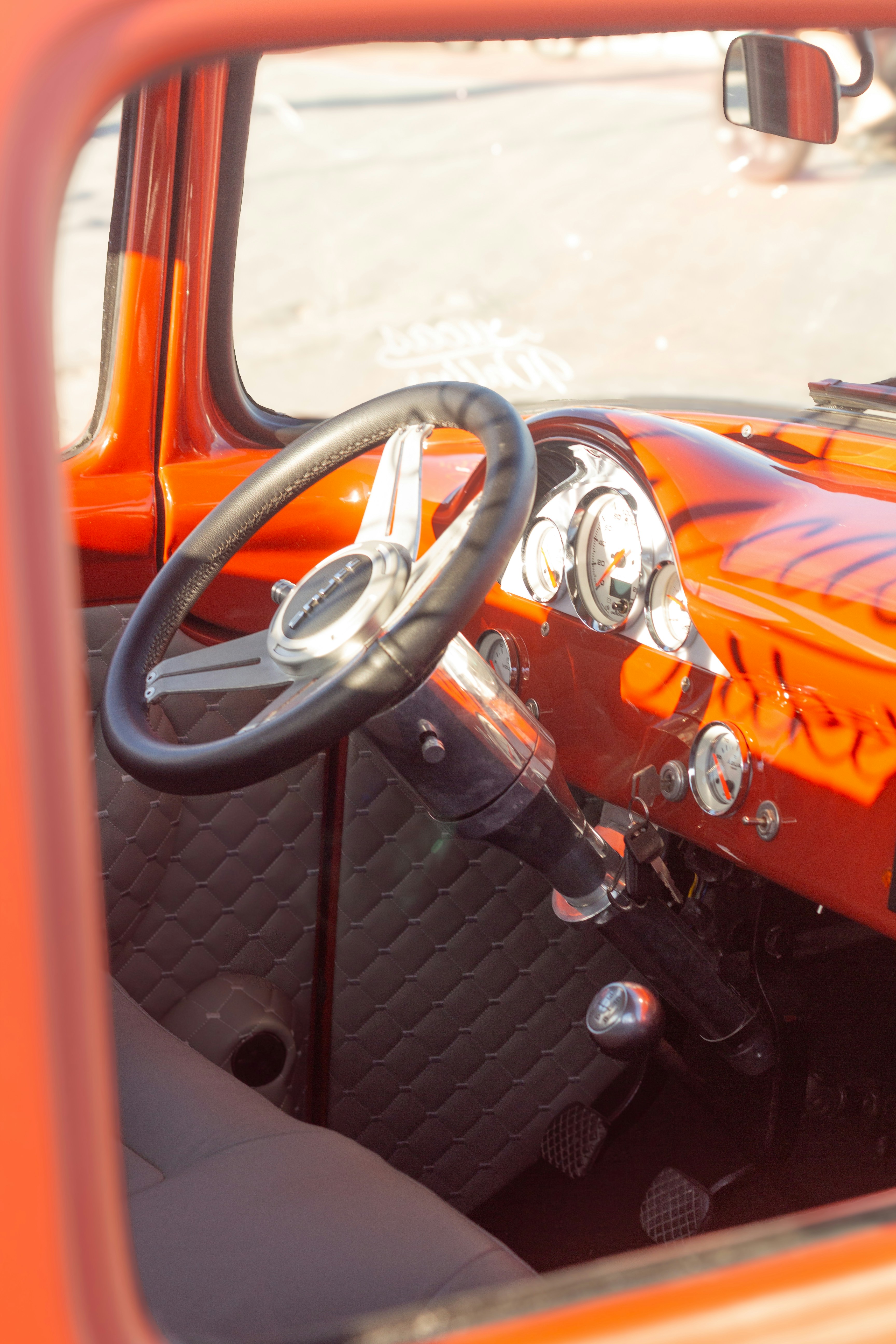 Crimson Cockpit: A Glimpse into a Classic Car’s Red Interior