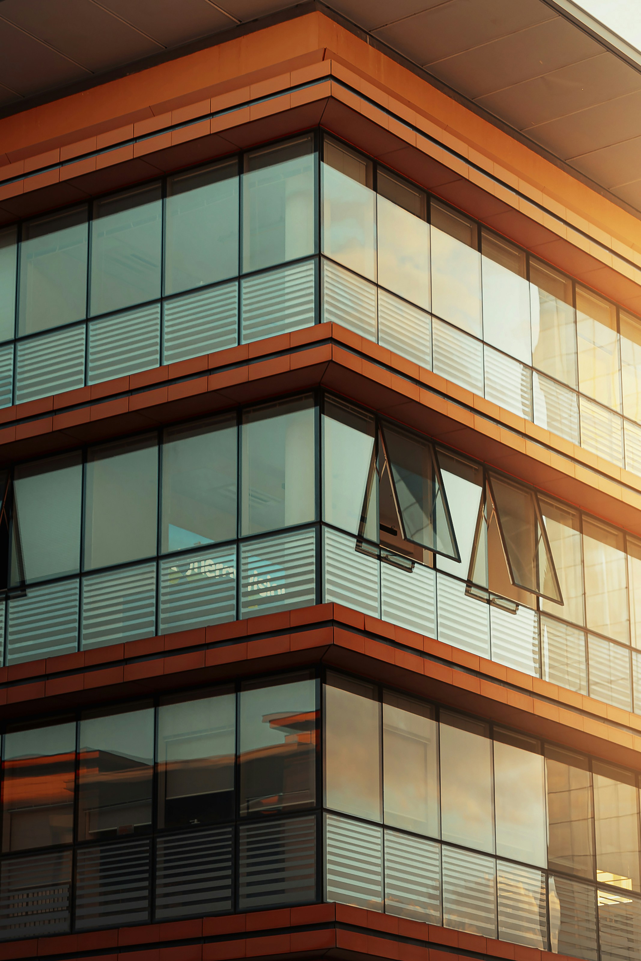 A tall building with lots of windows on top of it photo – Free Brescia ...