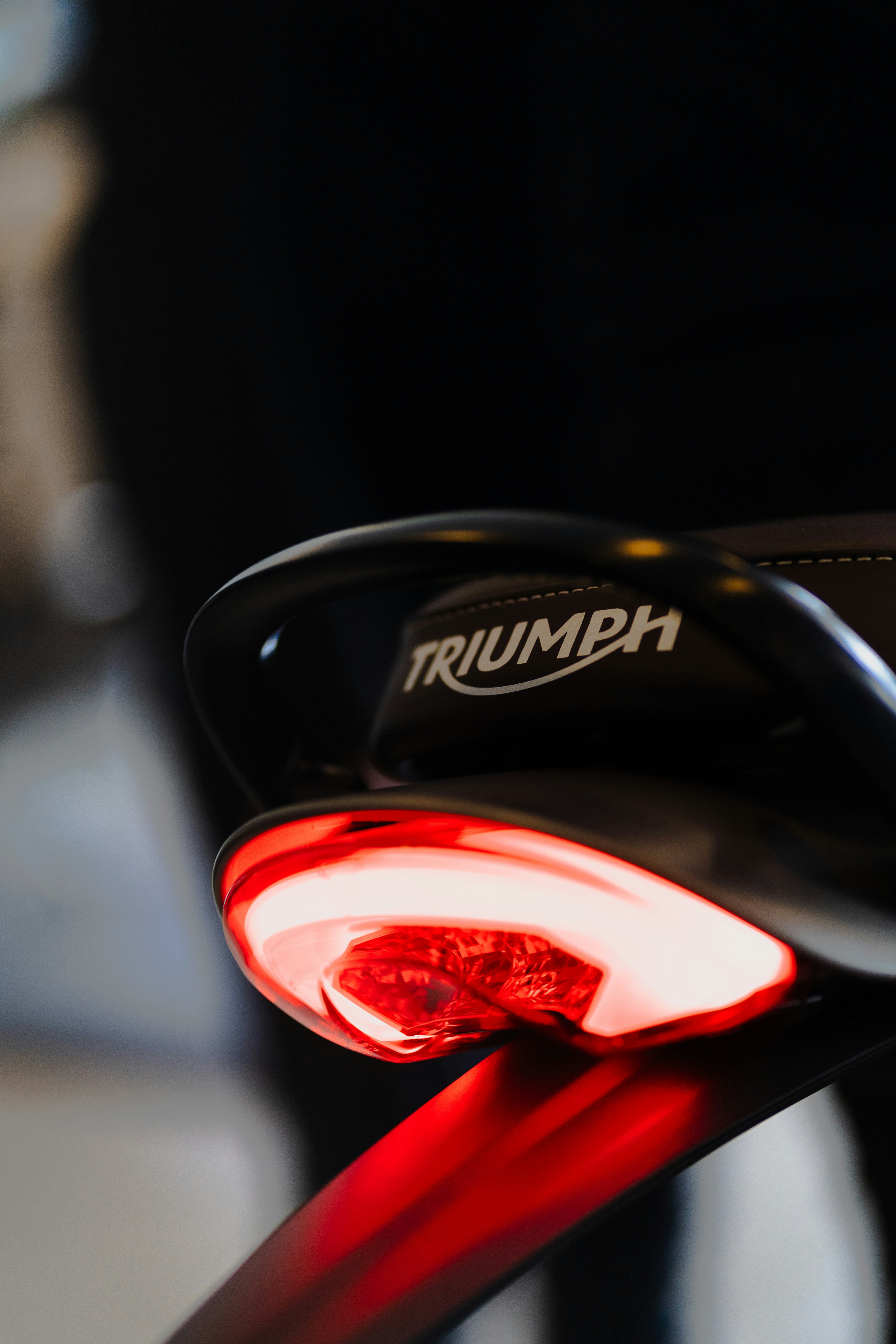 Triumph Tail Light: A Subtle Glimpse of the Bike’s Emblem