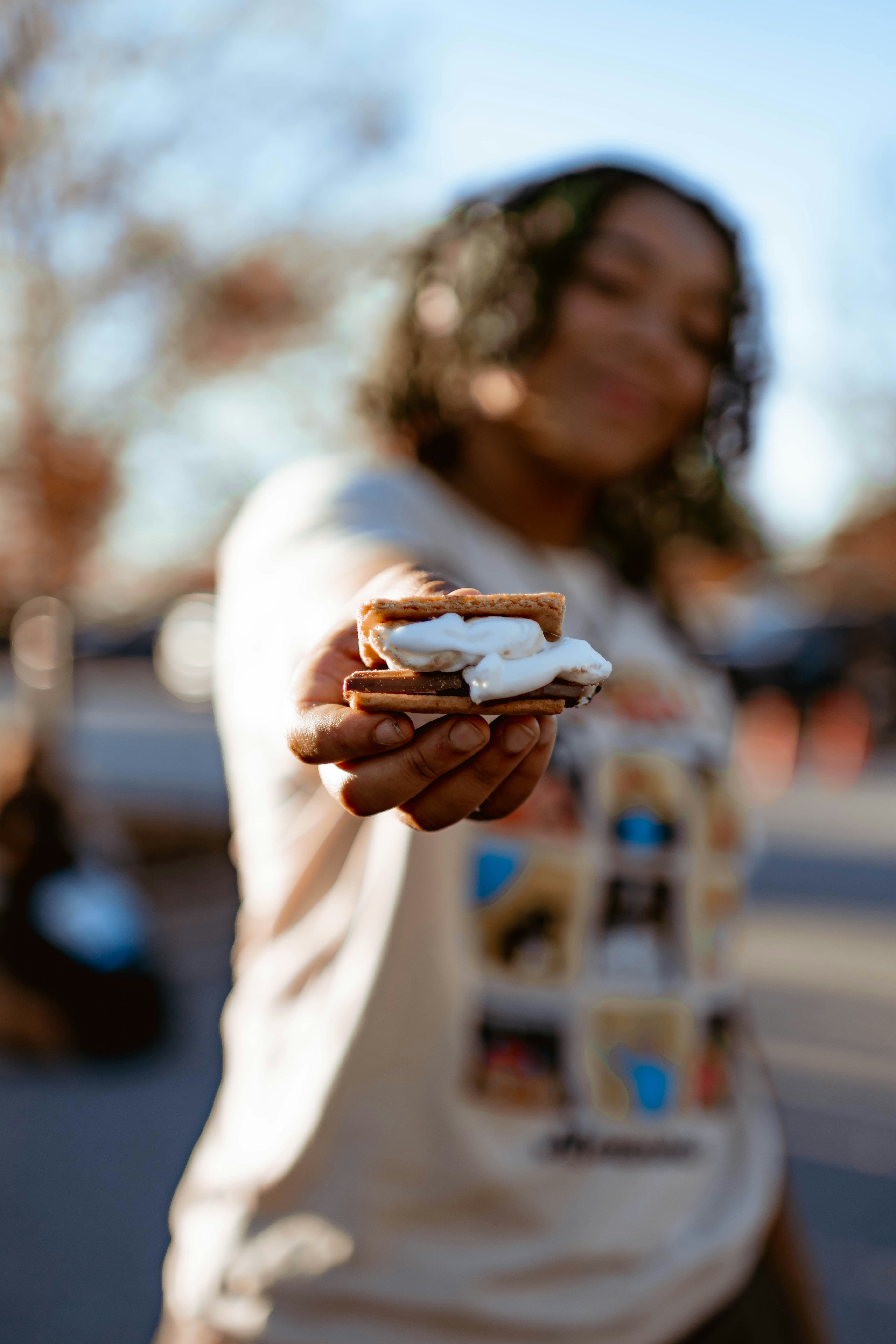 Front-Row S'more: A Warm Gesture in Soft Focus