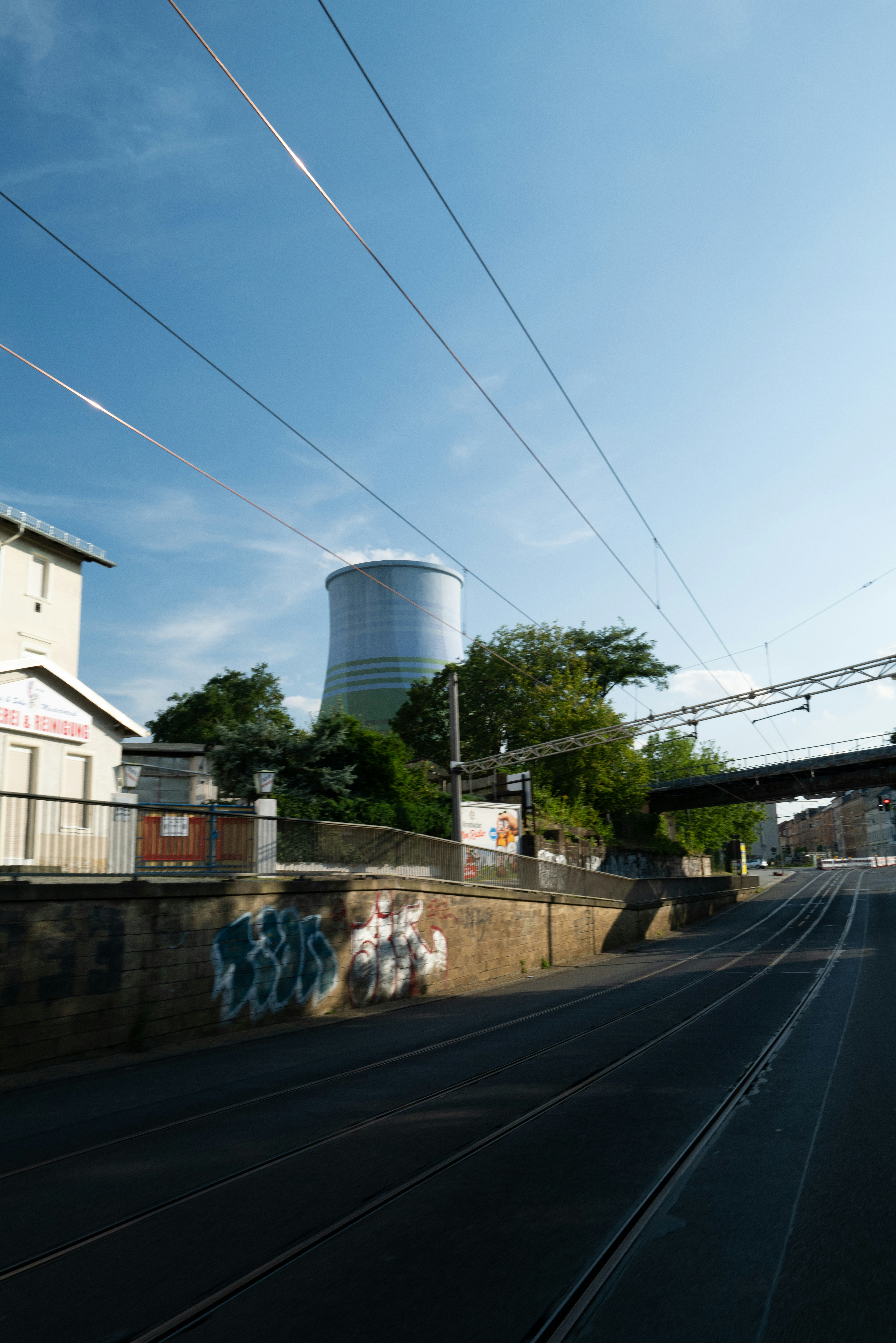 Rails, Wires, and a Water Tower: An Urban Perspective under a Clear Sky