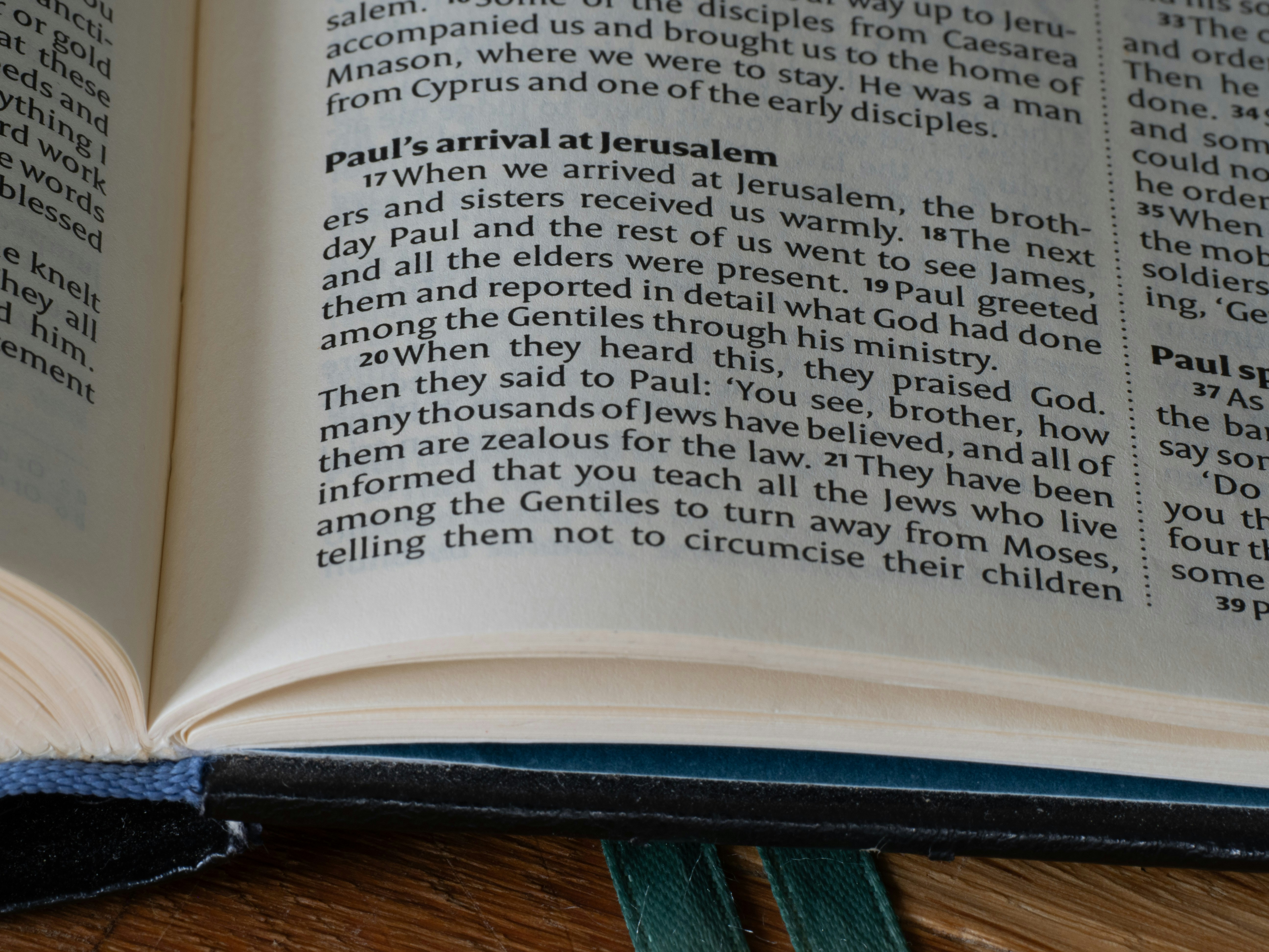 Close-Up of Tired Book Binding and Open Pages Preserving a Passage