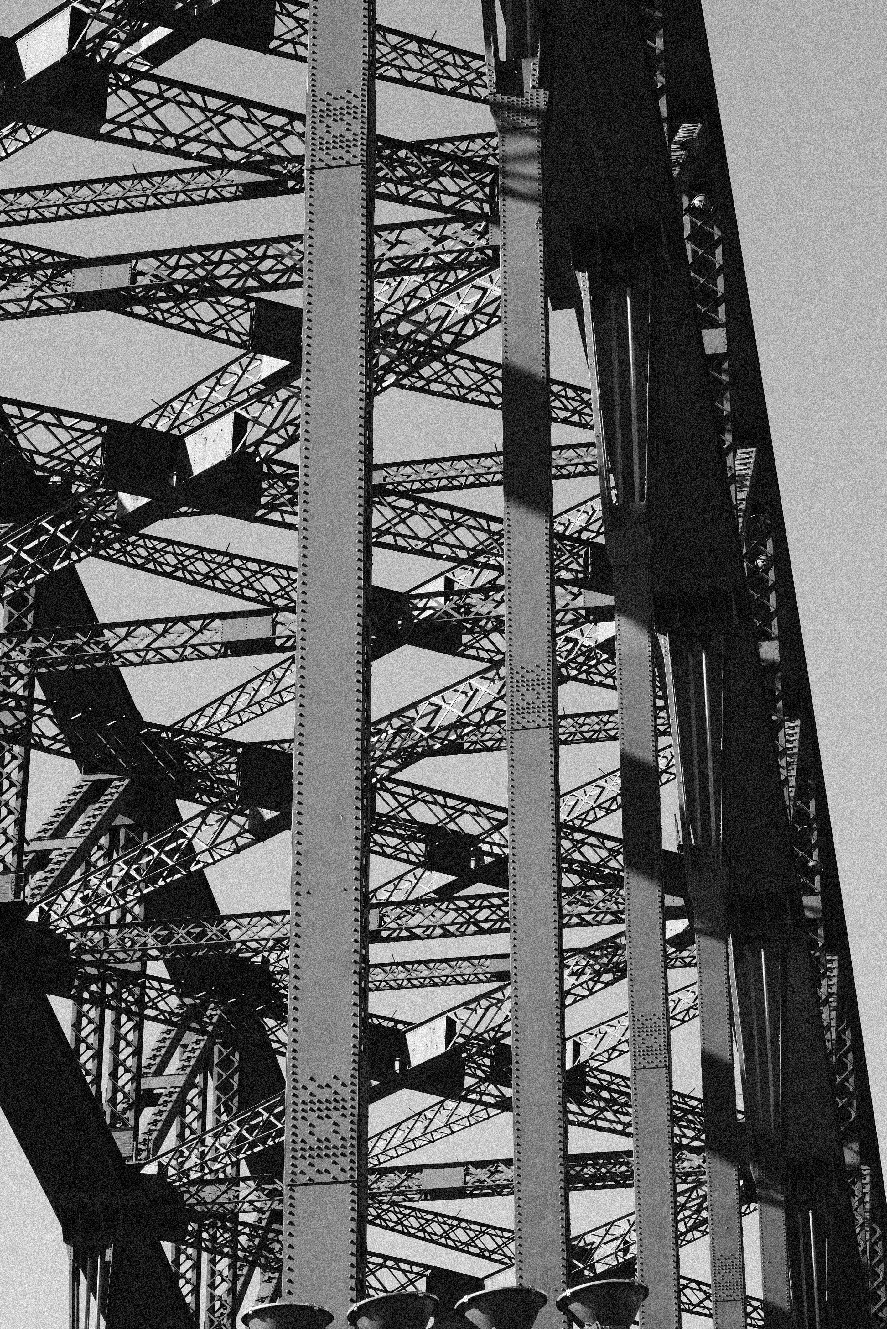 A black and white photo of a bridge